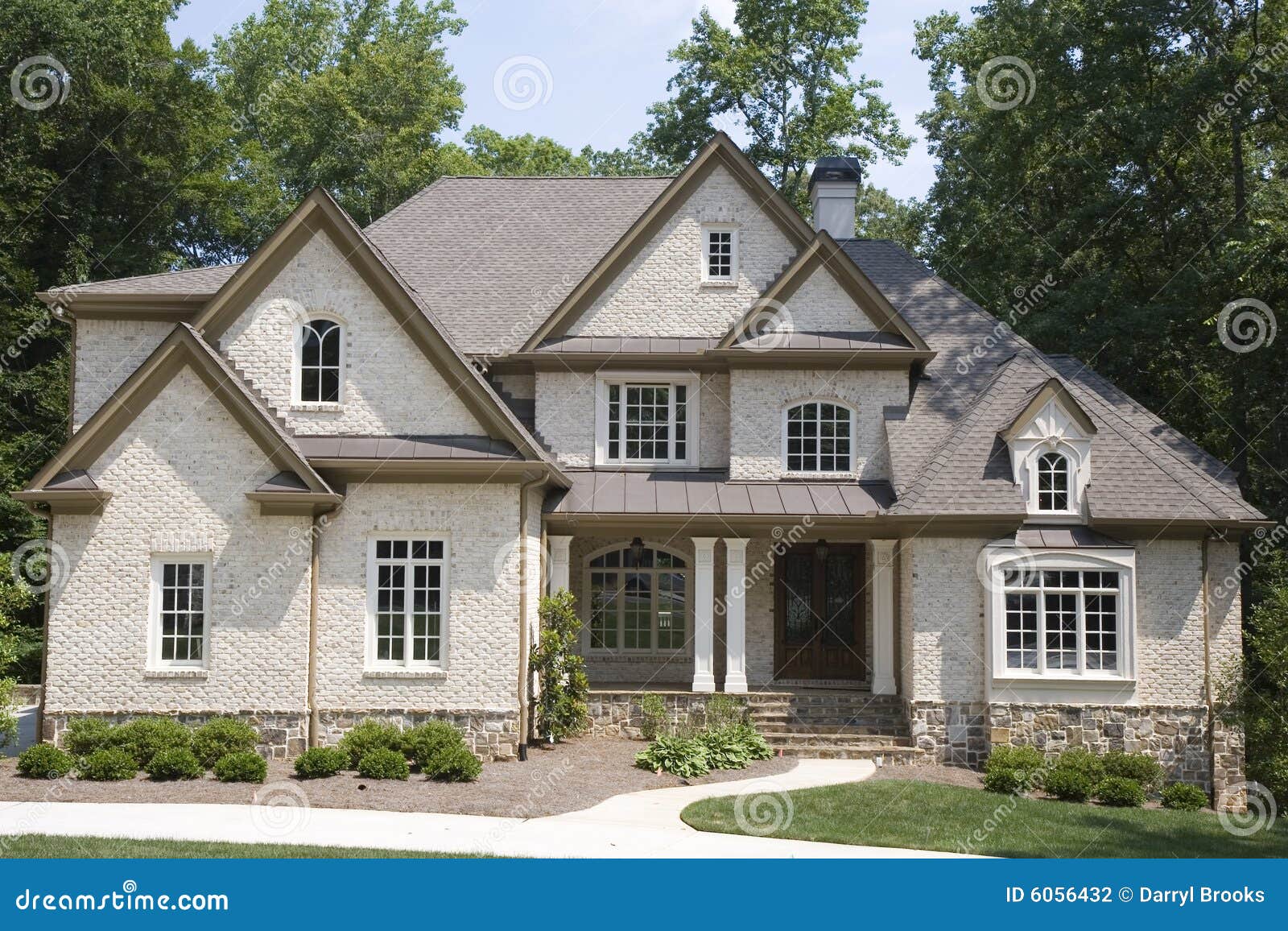 Tan Brick and Many Gables stock photo. Image of door, landscaping - 6056432