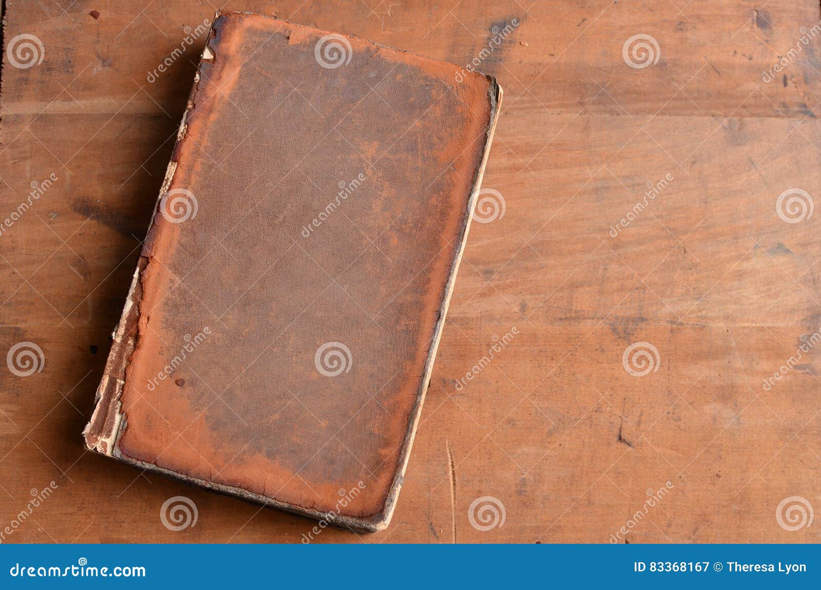 Tan Vintage Leather Bound Book Laying on Old Rustic Wood Stock Image ...