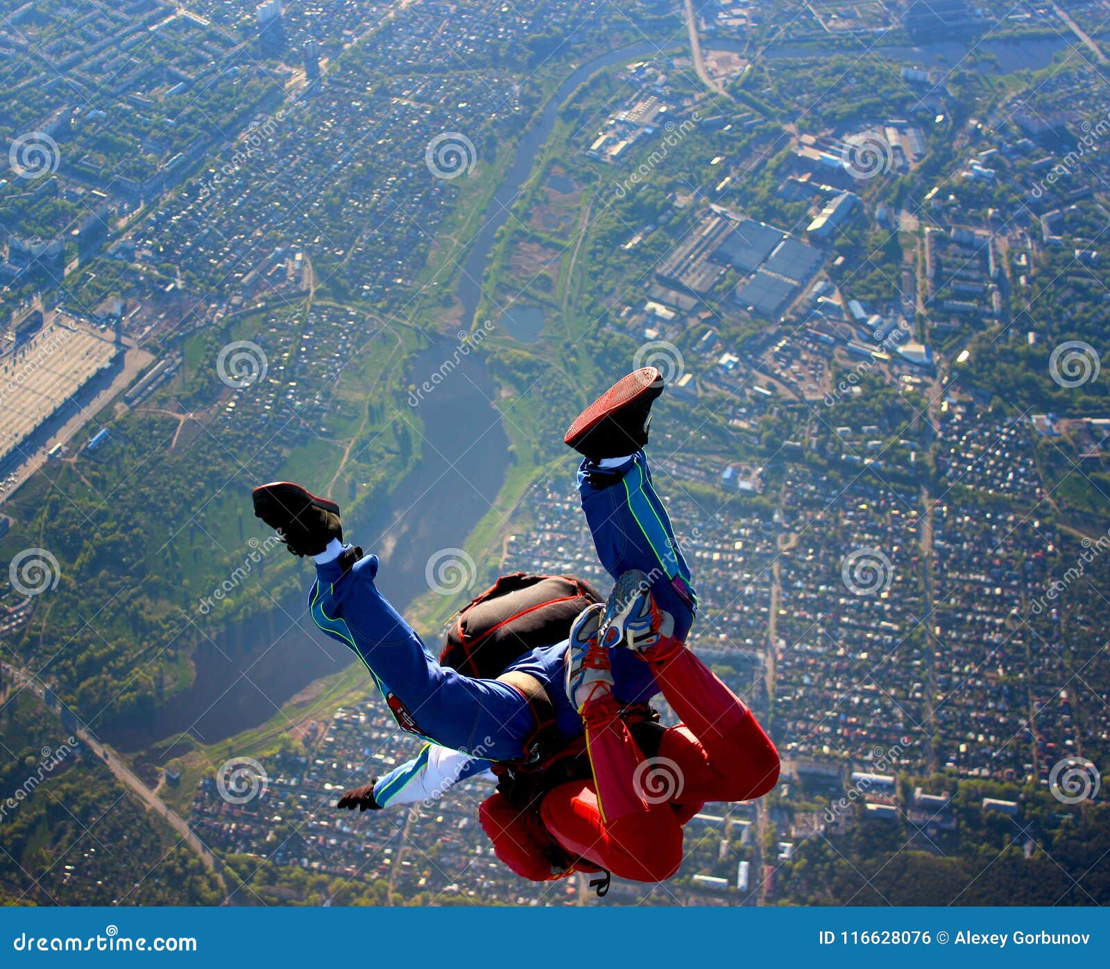 Tandem Parachute Jump. Silhouette Of Skydiver Flying In Blue Clear Sky ...