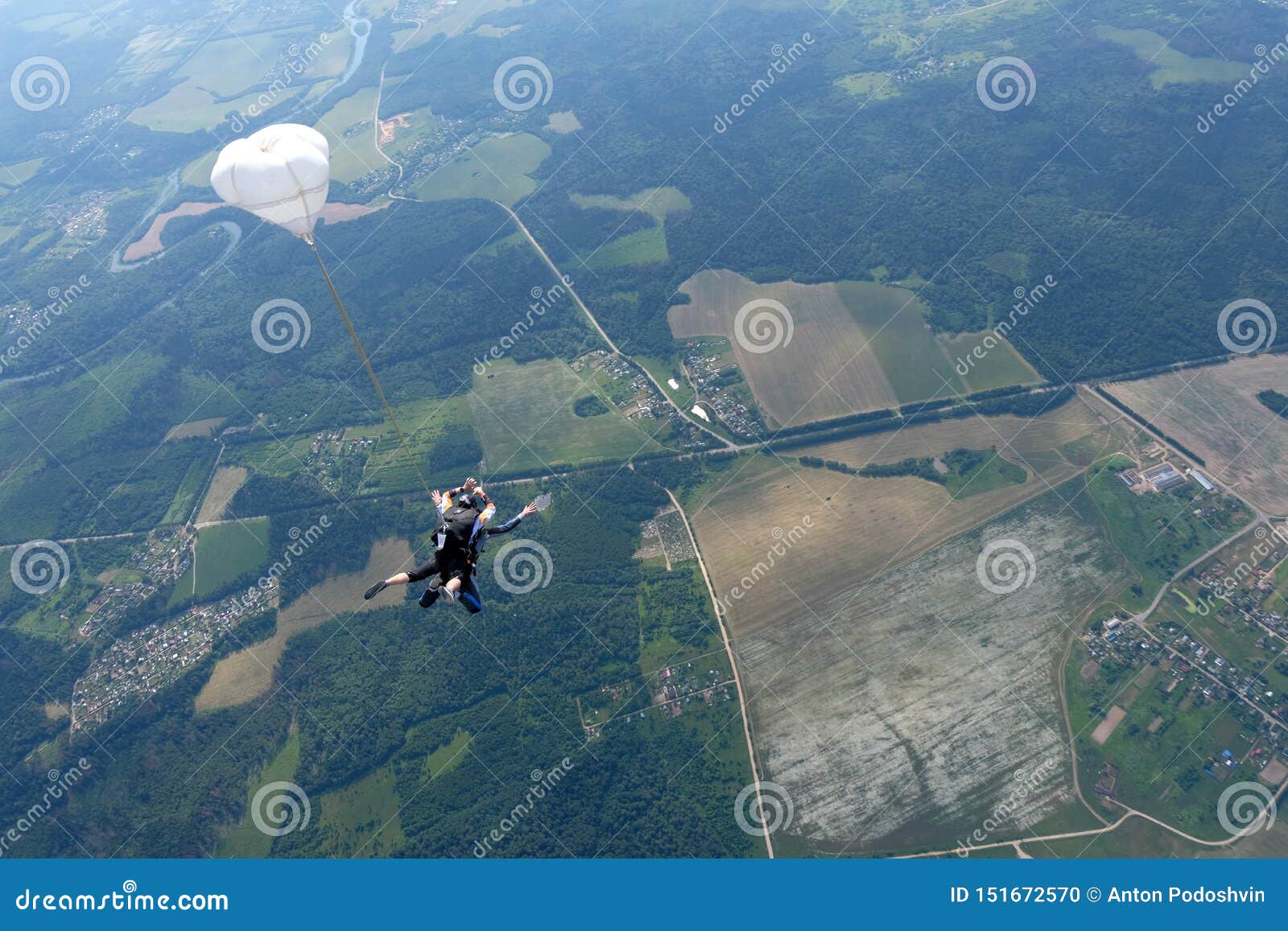Tandem Skydiving. Two Guys are Falling in the Sky. Stock Photo - Image ...