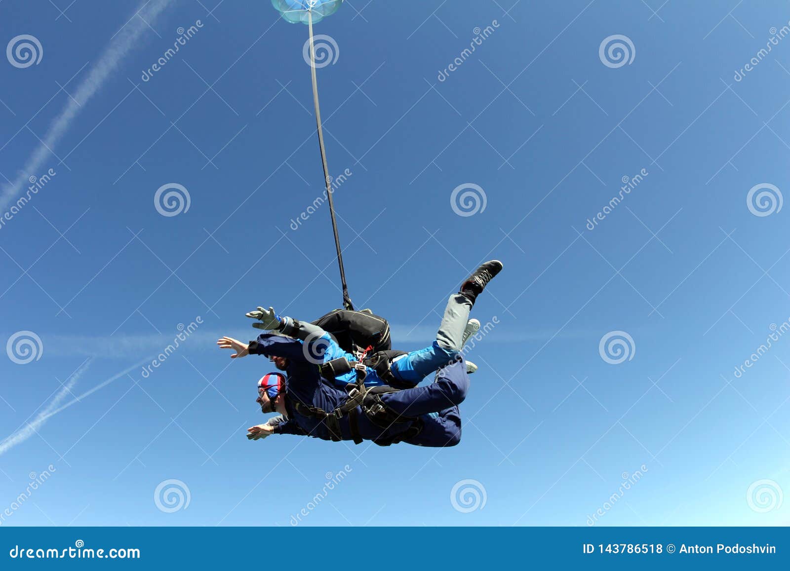 Tandem Skydiving. Two Guys are Having Fun in the Sky. Stock Photo ...