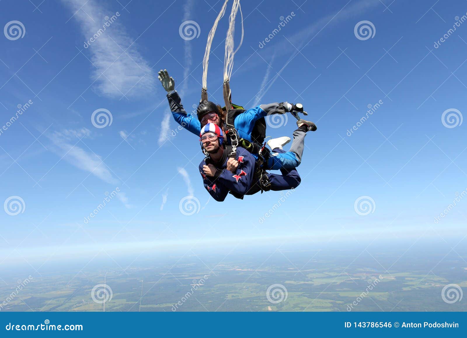 Tandem Skydiving. Two Guys are Having Fun in the Sky. Stock Photo ...