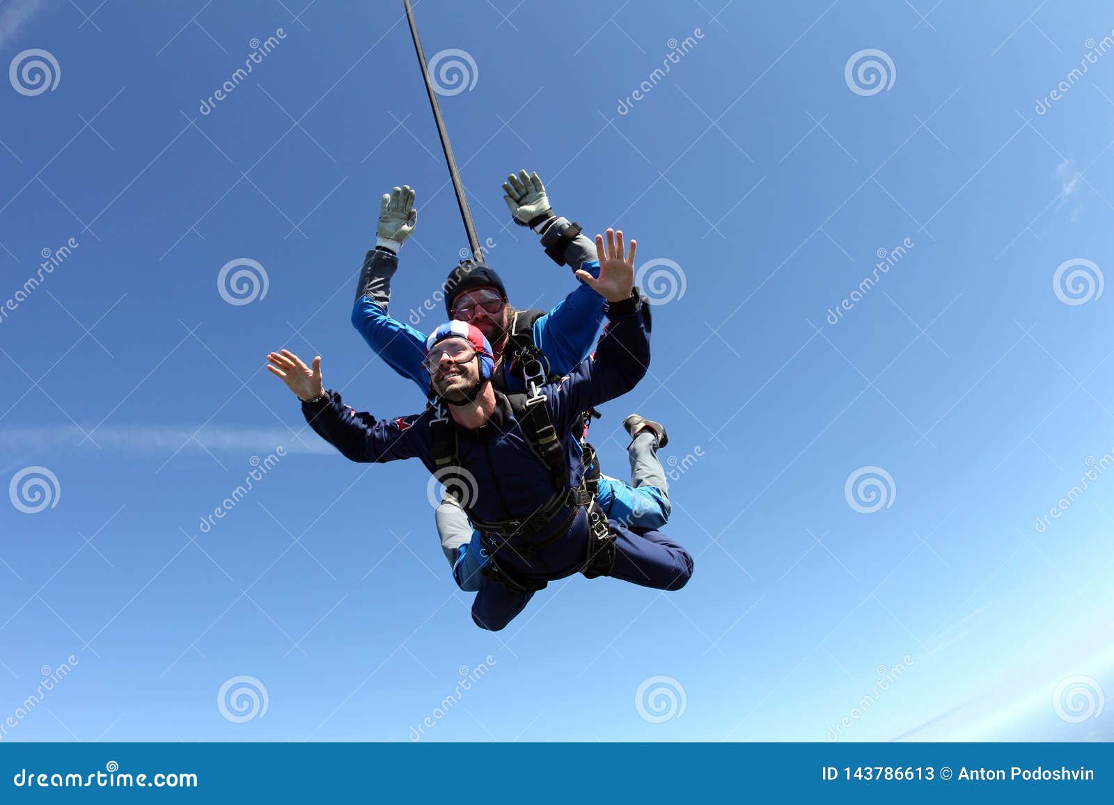 Tandem Skydiving. Two Guys are Having Fun in the Sky. Stock Image ...