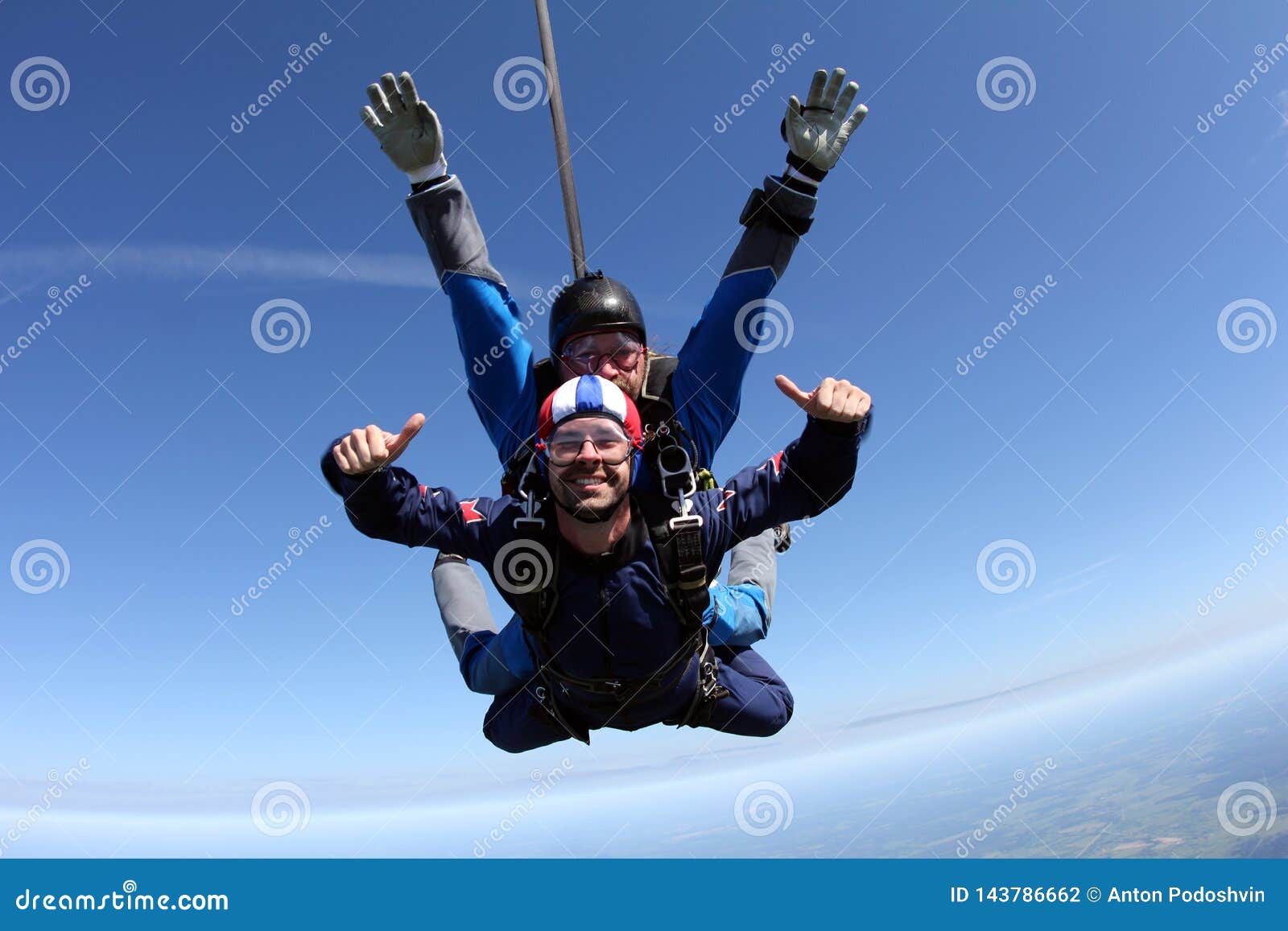 Tandem Skydiving. Two Guys are Having Fun in the Sky. Stock Photo ...