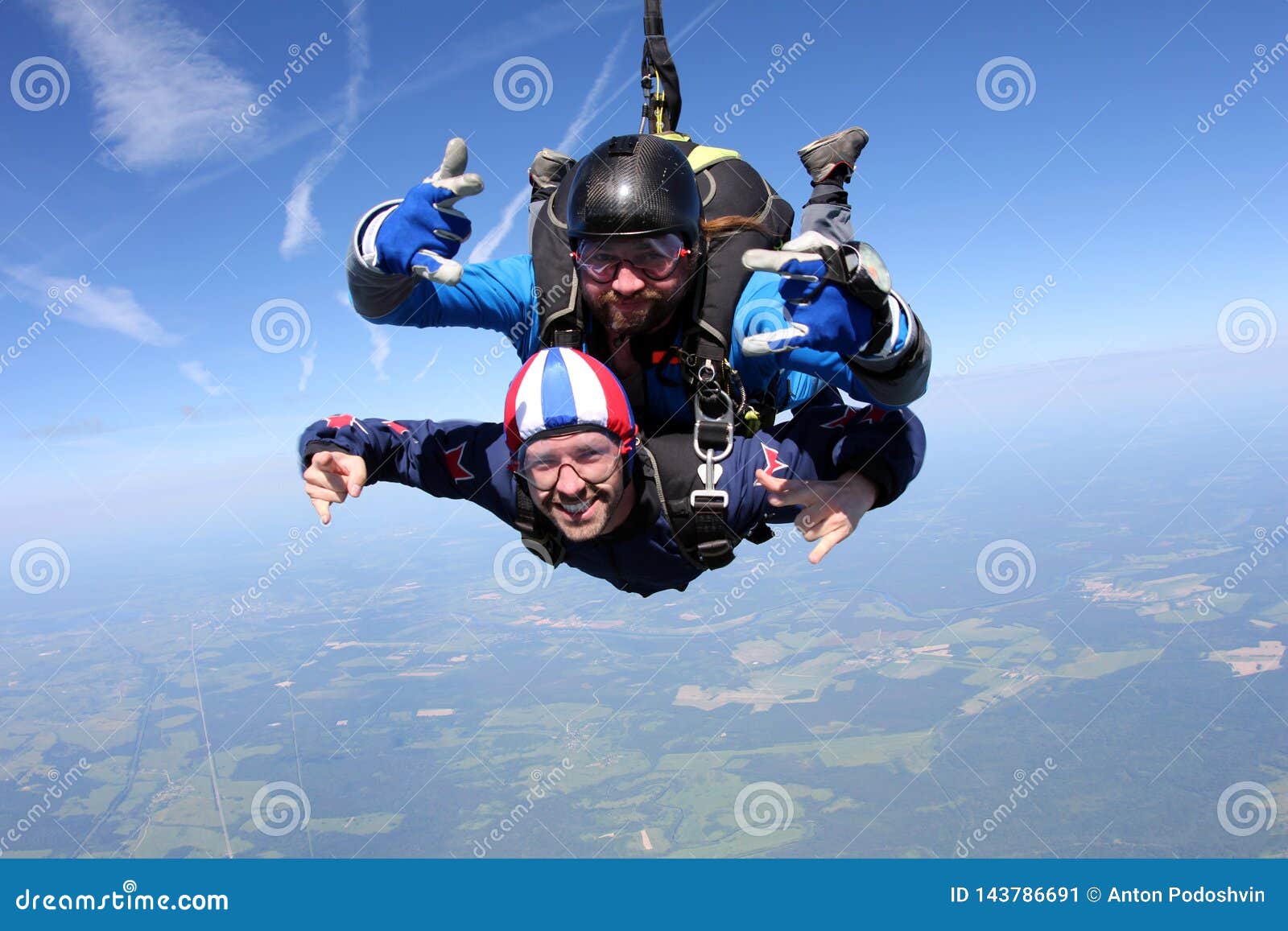 Tandem Skydiving. Two Guys are Having Fun in the Sky. Stock Image ...