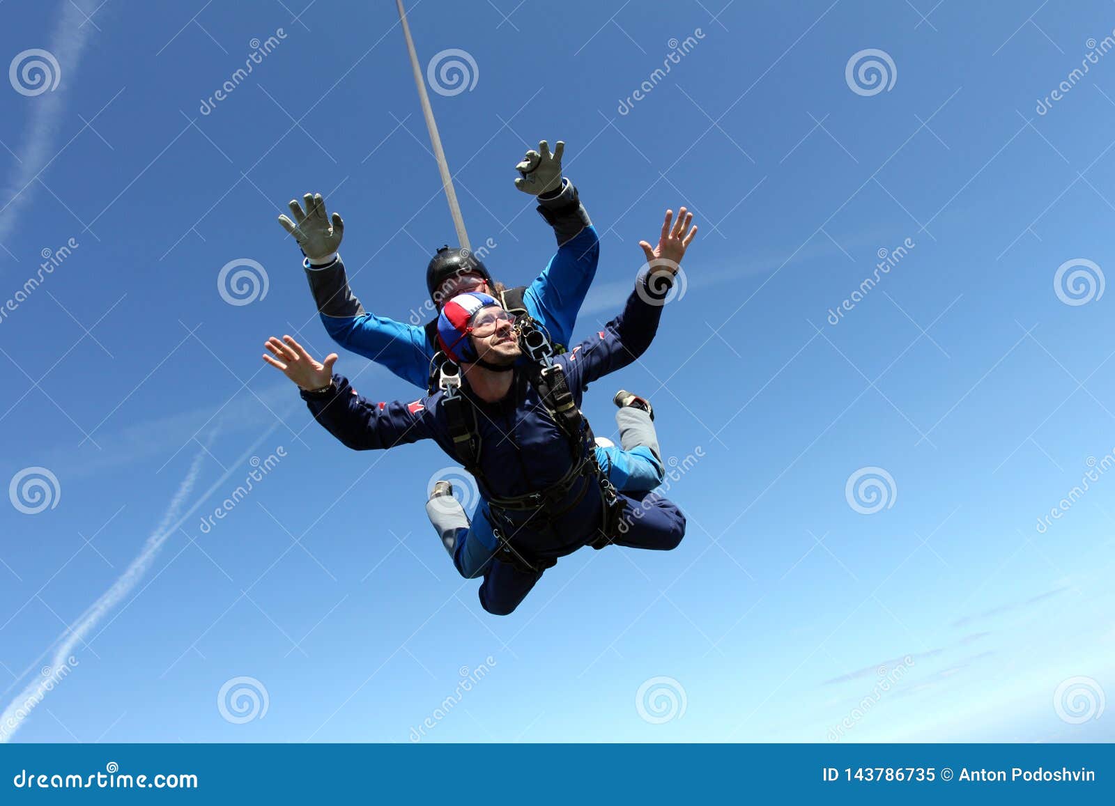 Tandem Skydiving. Two Guys are Having Fun in the Sky. Stock Image ...