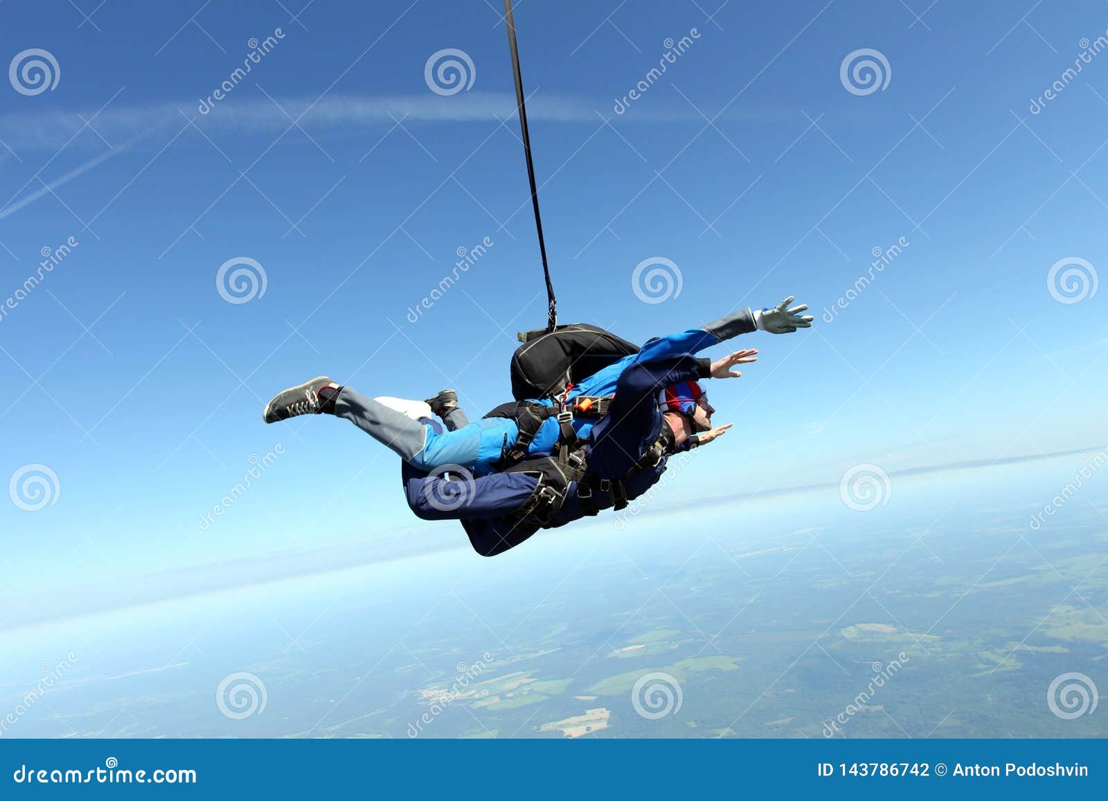 Tandem Skydiving. Two Guys are Having Fun in the Sky. Stock Photo ...
