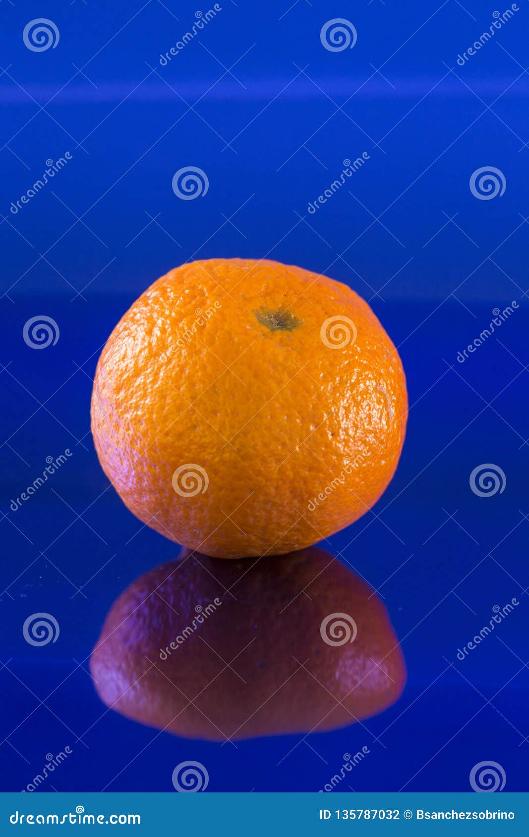 Tangerine on the Immense Blue Stock Photo - Image of color, orange ...