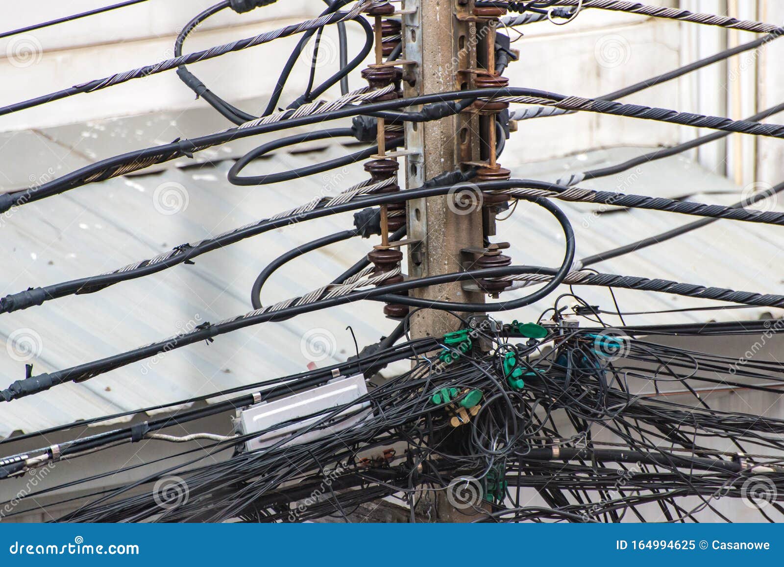 Tangle of Cables and Wires on Electric Pole in the City Stock Image ...