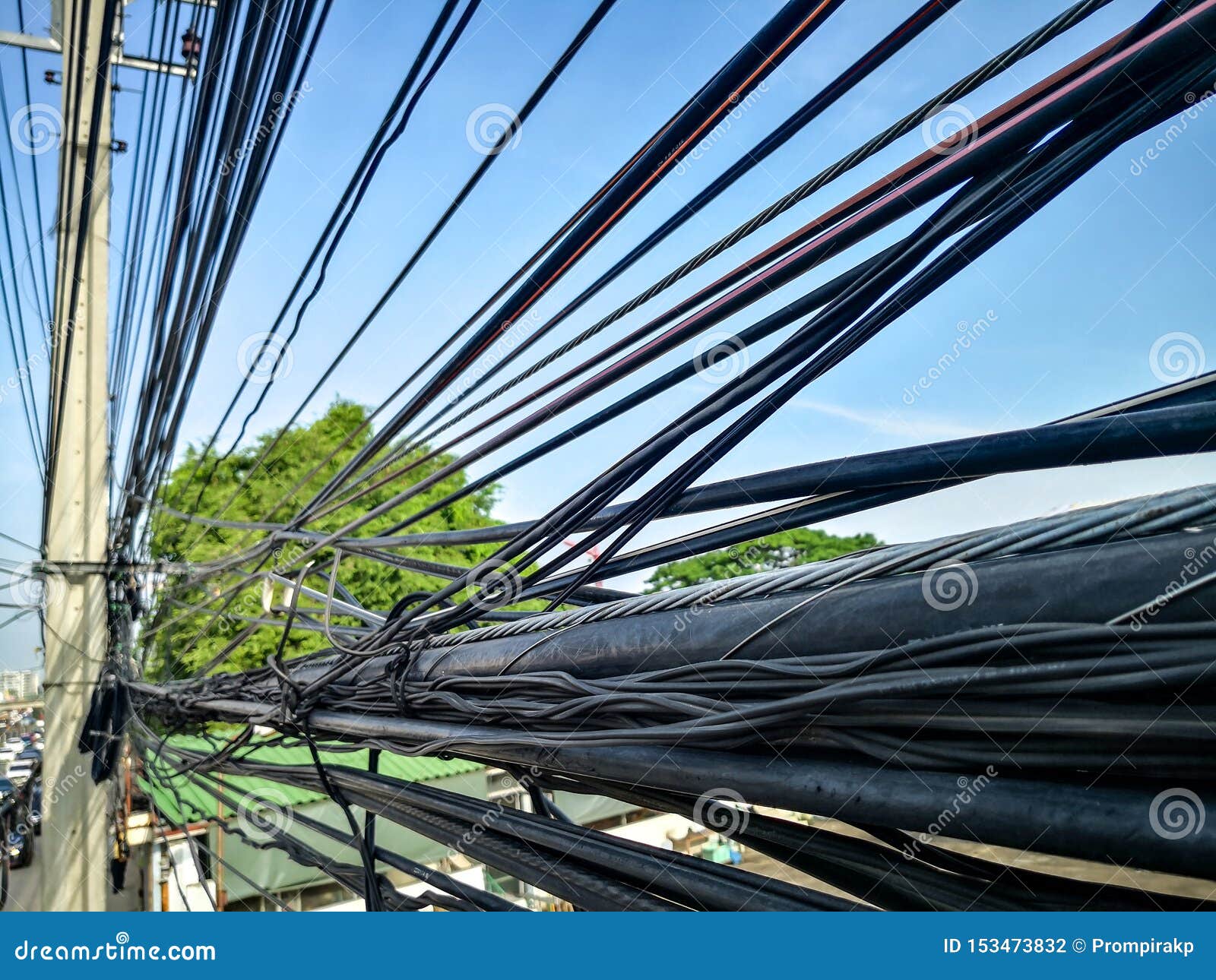 Tangle of Electrical Cables and Communication Wires on Electric Pole ...