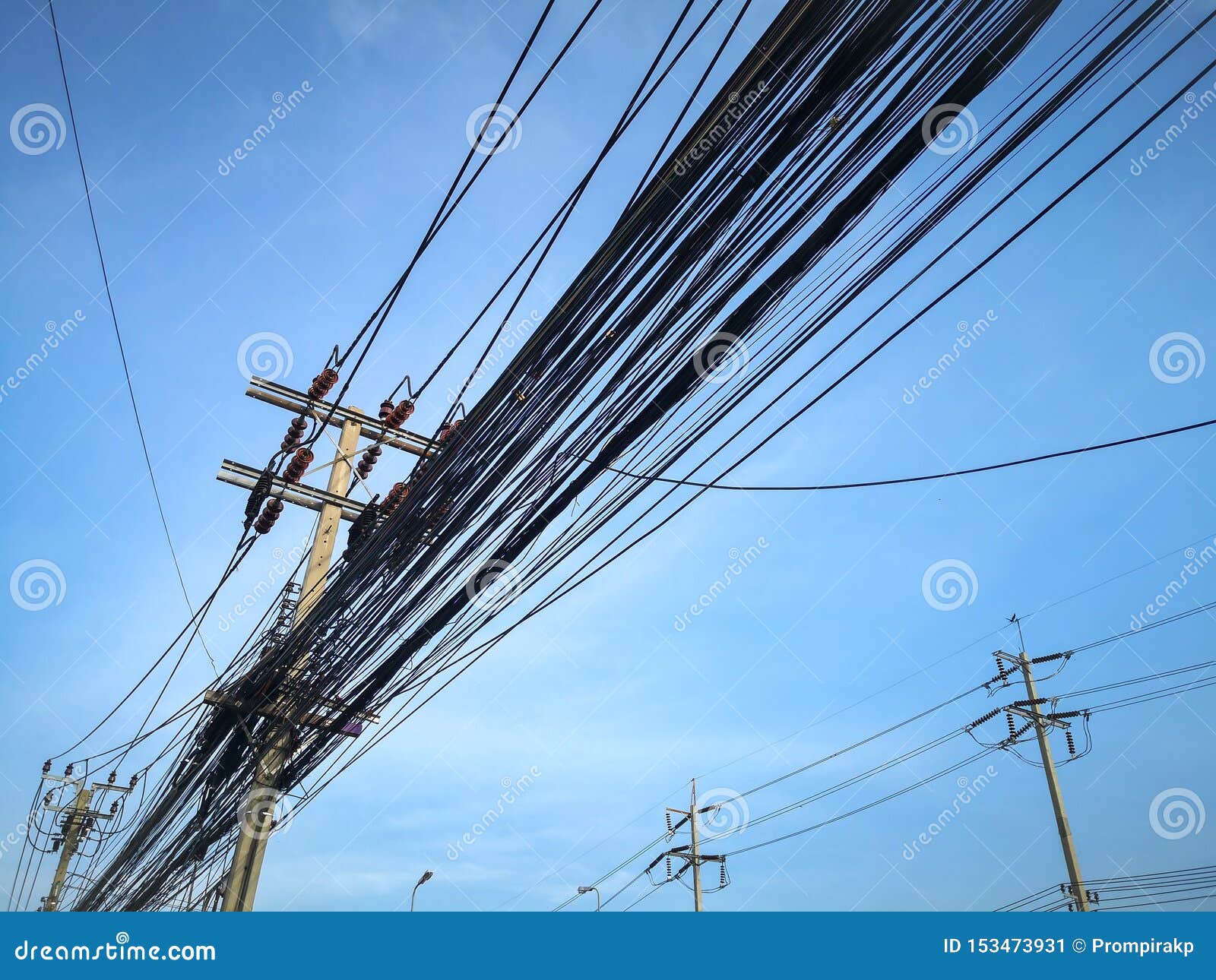 Tangle of Electrical Cables and Communication Wires on Electric Pole ...