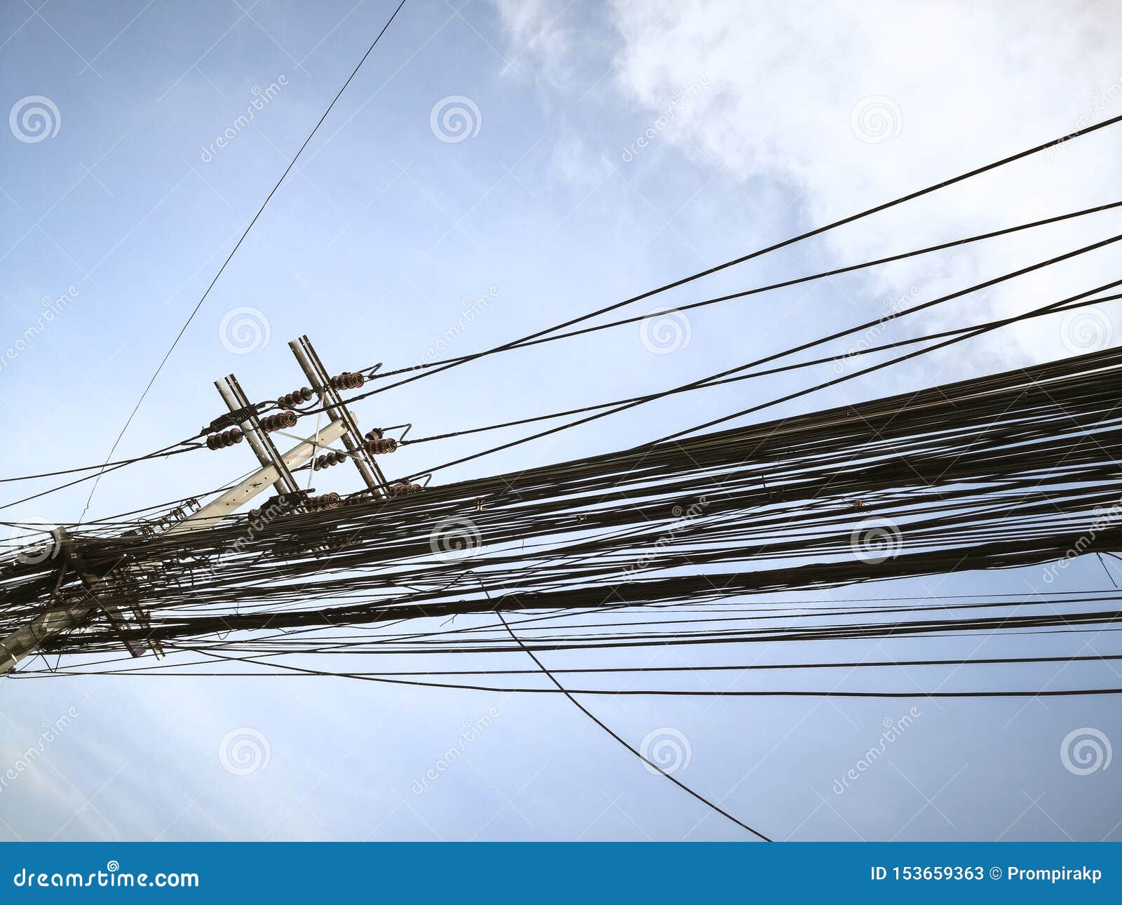 Tangle of Electrical Cables and Communication Wires on Electric Pole ...