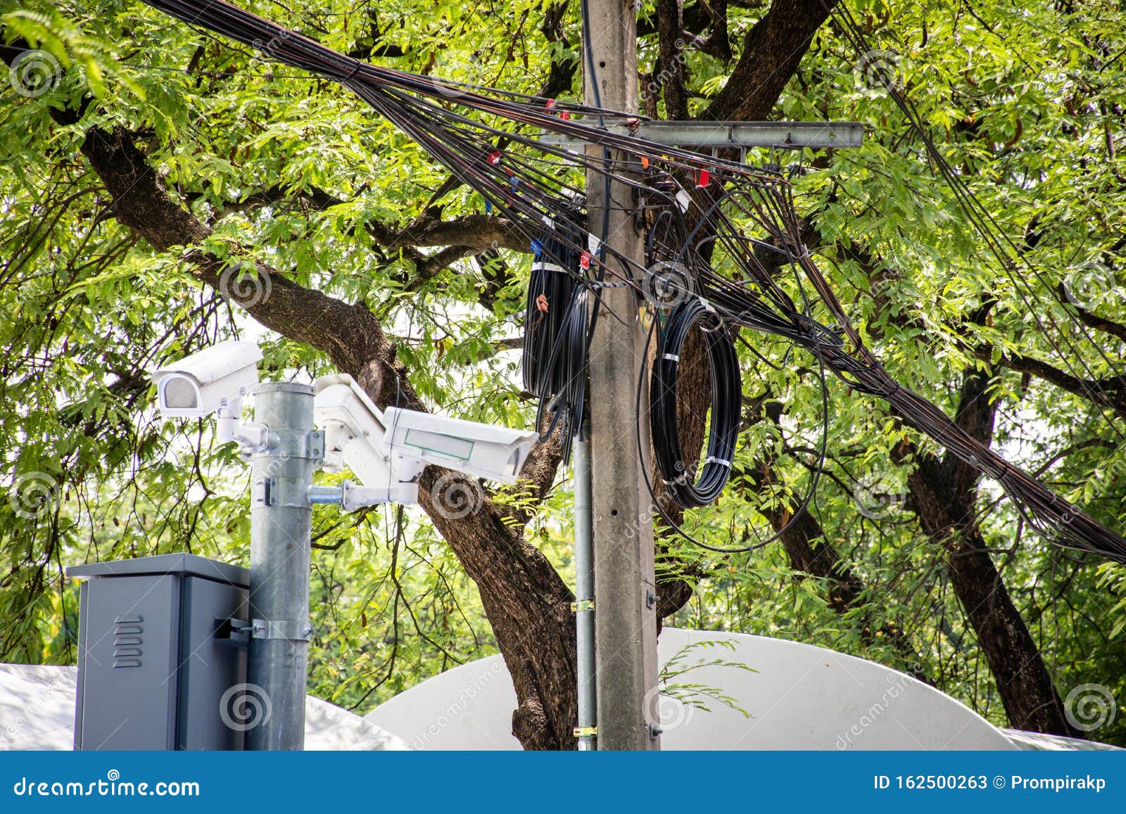 Tangle Of Electrical Cables And Communication Wires On Electric Pole ...