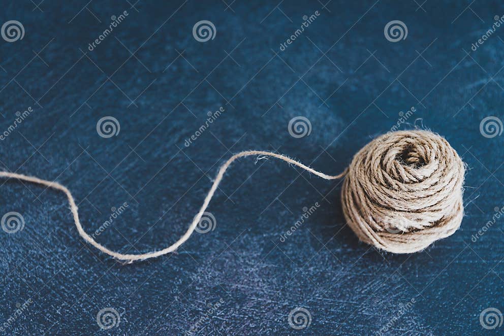Tangled Ball of Thread with String Popping Out of it Stock Image ...