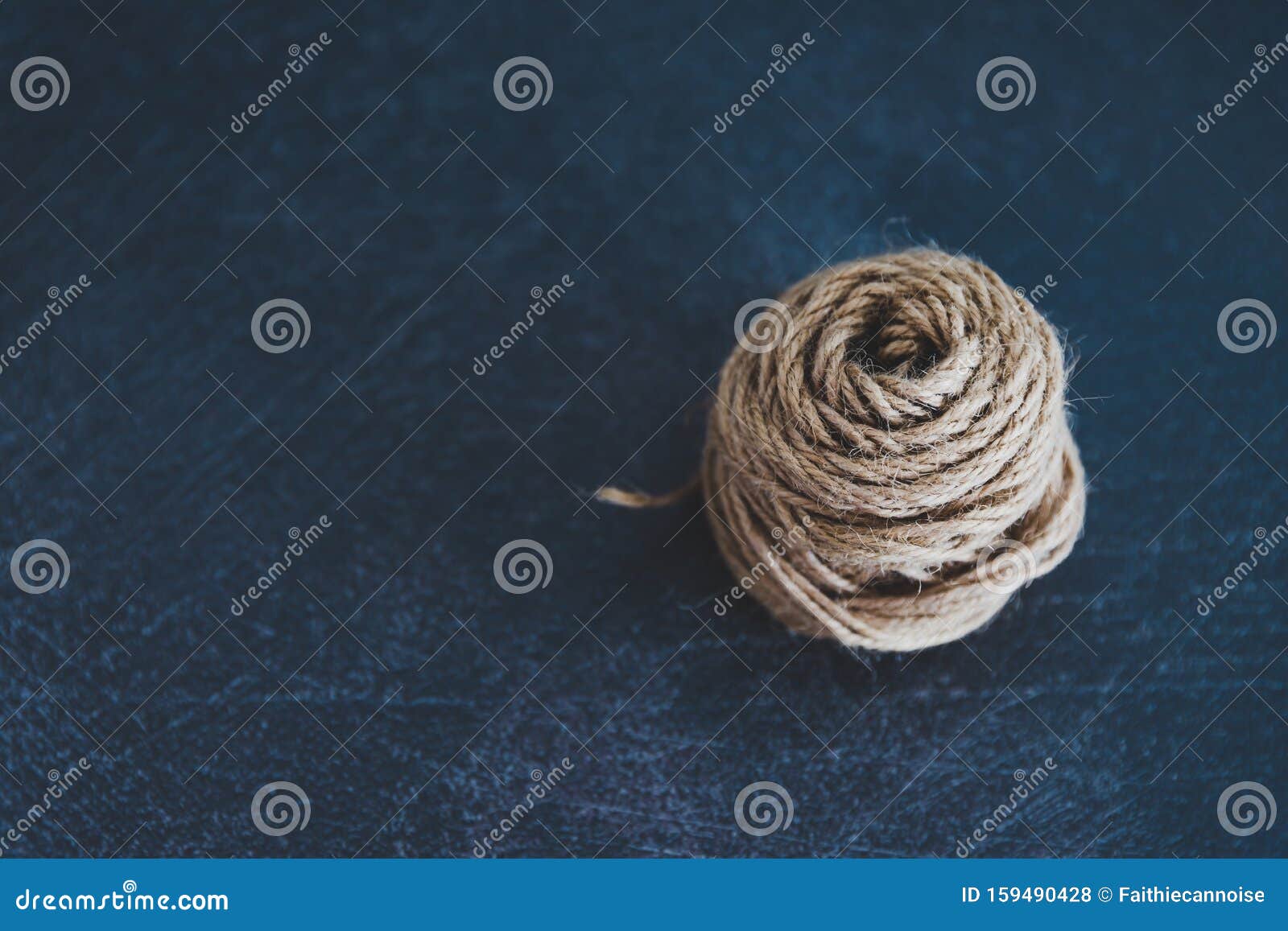Tangled Ball of Thread with String Popping Out of it Stock Photo ...
