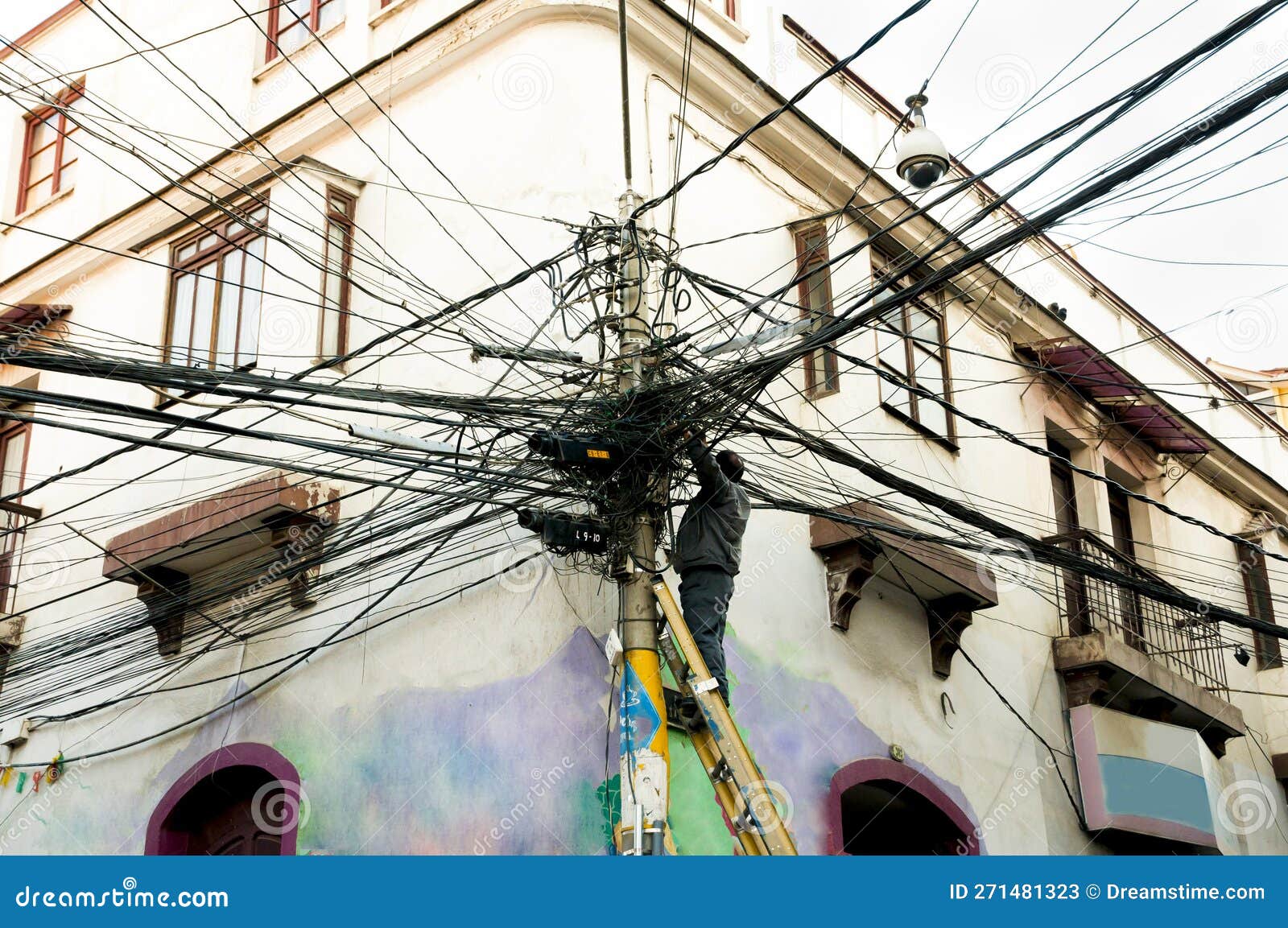 Tangled Electric Pole Wires Stock Photo | CartoonDealer.com #263779926
