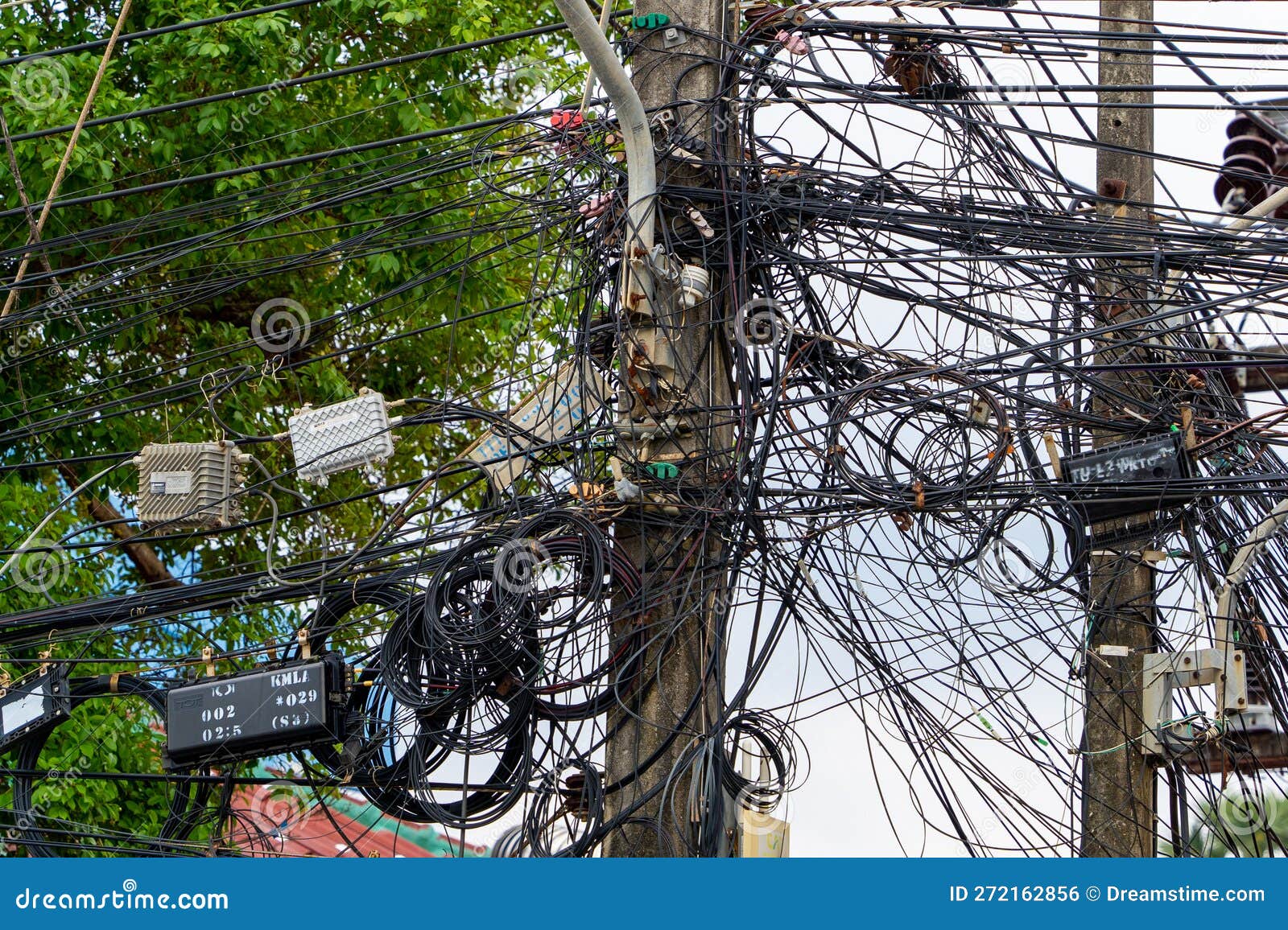 Tangled Electrical Wires On Urban Electric Pole. Disorganized And Messy ...