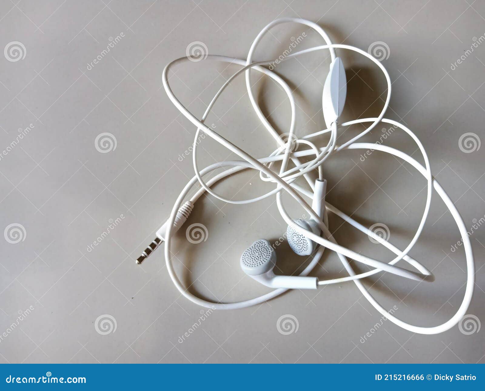 Tangled smartphone headset stock photo. Image of untangled - 215216666