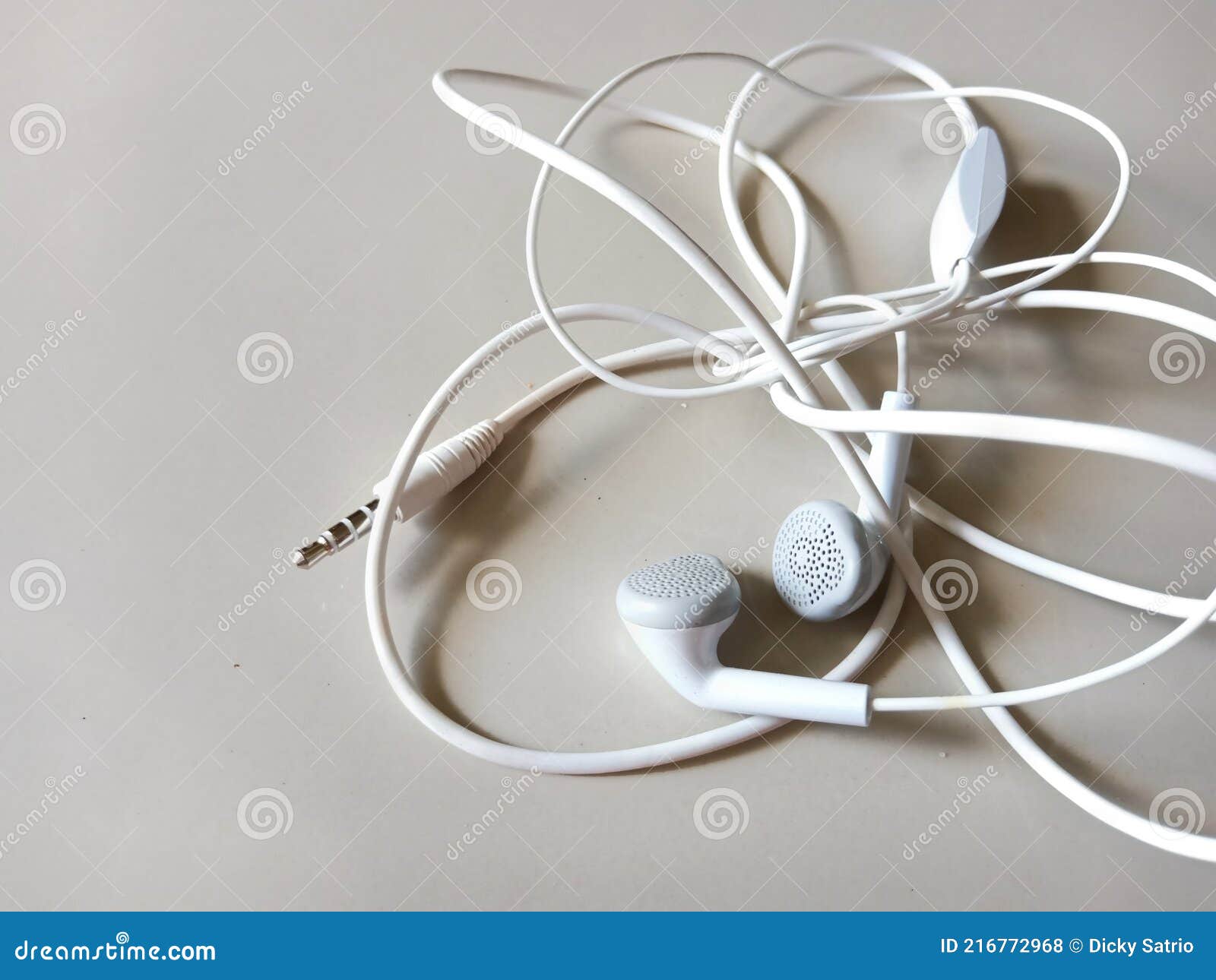 A Tangled Smartphone Headset Stock Photo - Image of headphone, headset ...