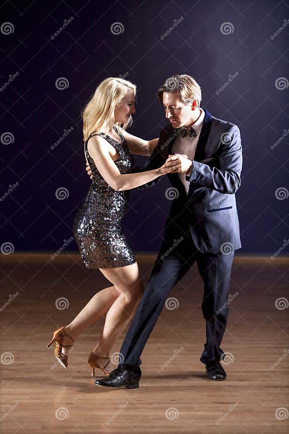 Tango Dancers in Dance Studio Stock Photo - Image of model, ballroom ...