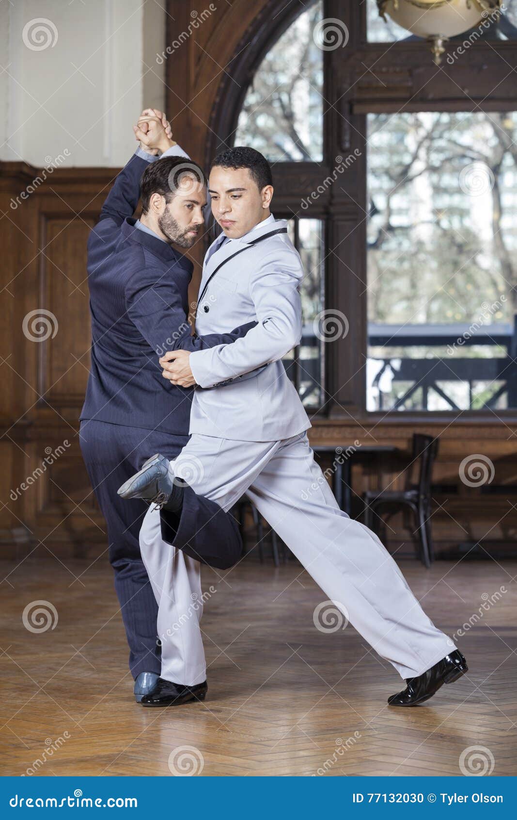 Tango Dancers Performing Gancho Step Stock Photo - Image of posture ...