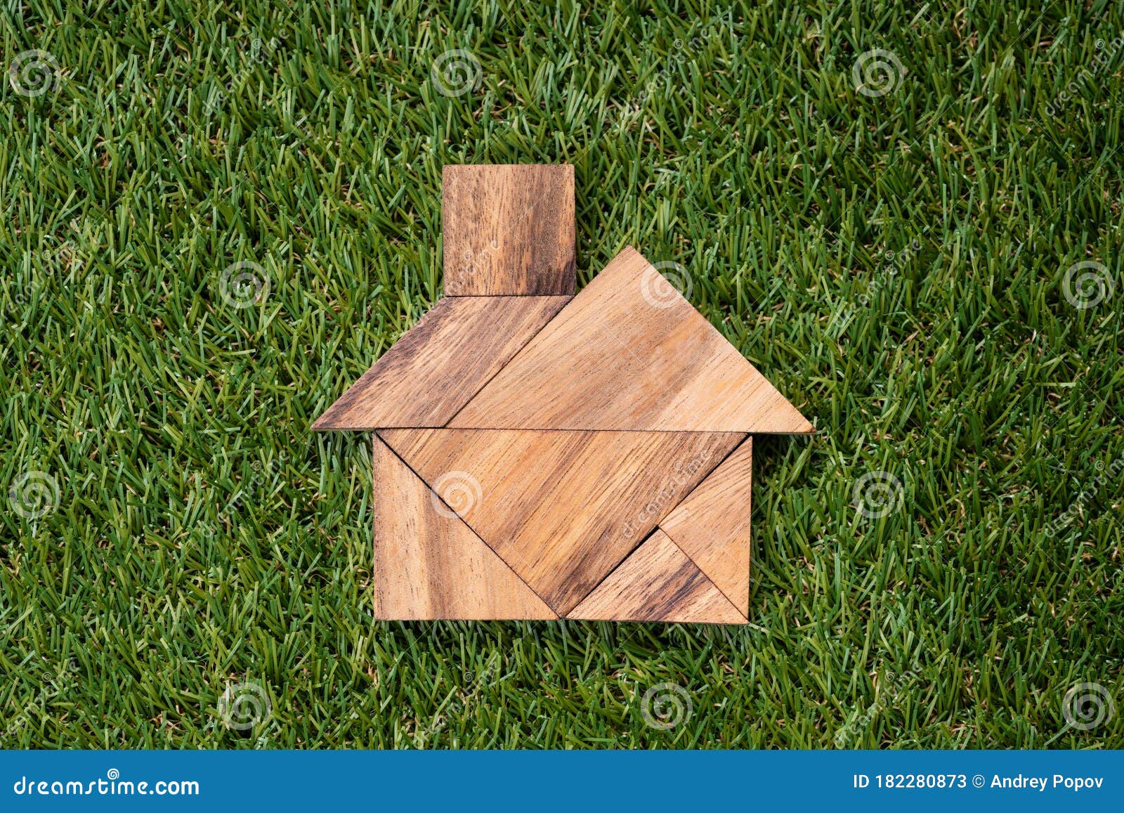 Tangram Puzzle in Home Shape on Green Grass Background Stock Image ...