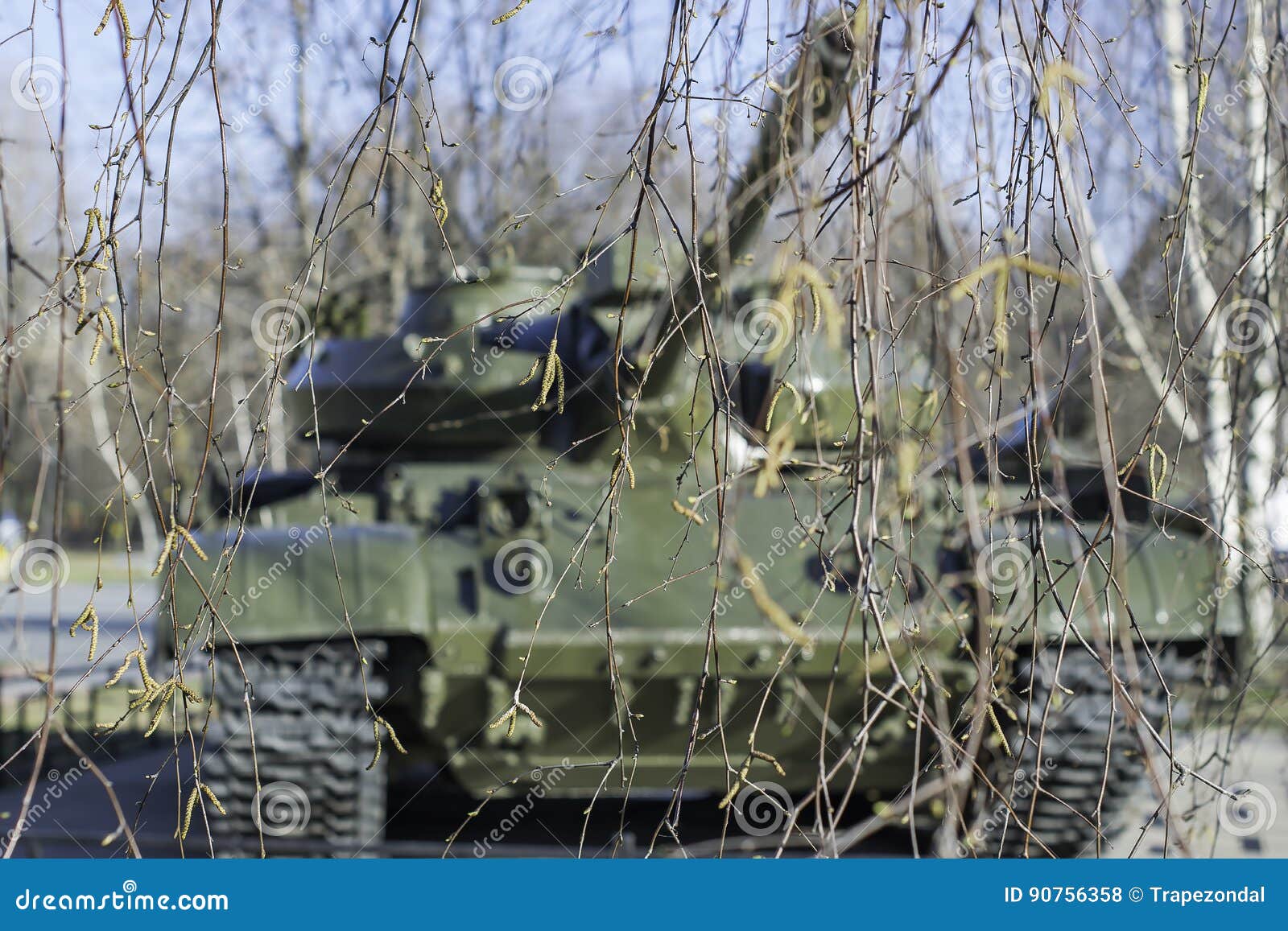 Tank behind the trees stock photo. Image of military - 90756358