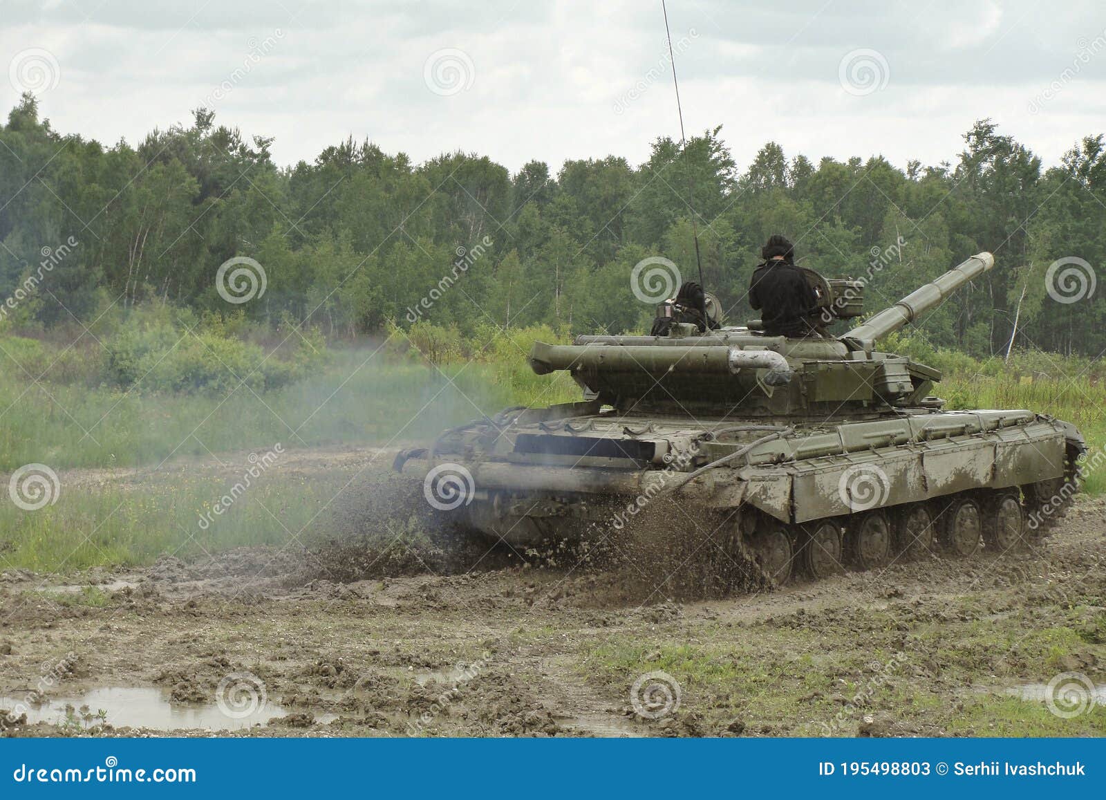 Tank Goes through a Swamp. Military Exercises on Shooting Range. Stock ...