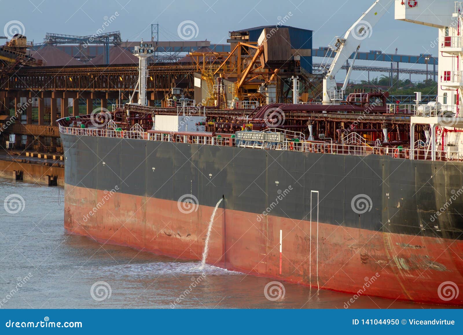 Tanker Discharging Cooling Water Water in Harbor Waters at Evening Time ...