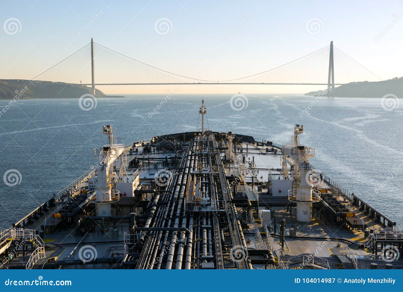 Tanker Ship is Steering Under the Bridge. Stock Image - Image of vessel ...