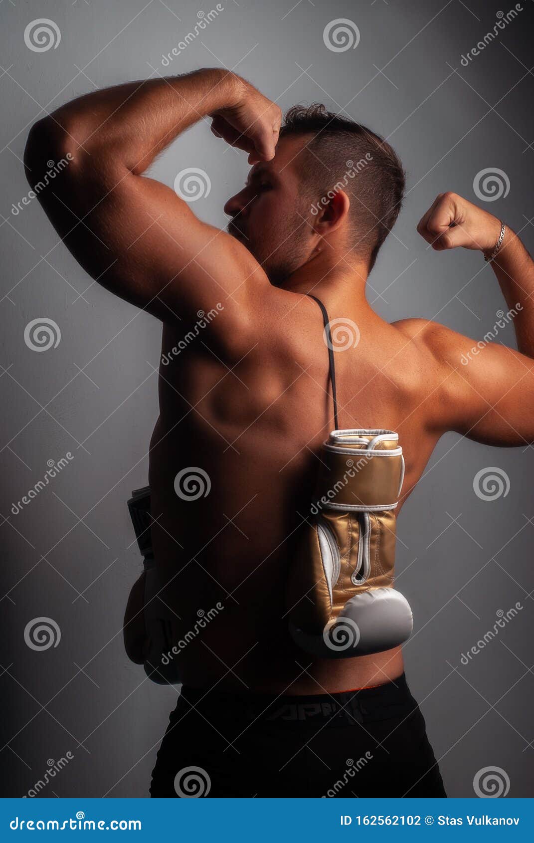 Tanned Boxer Posing Against the Wall. Muscular Back Stock Photo - Image ...