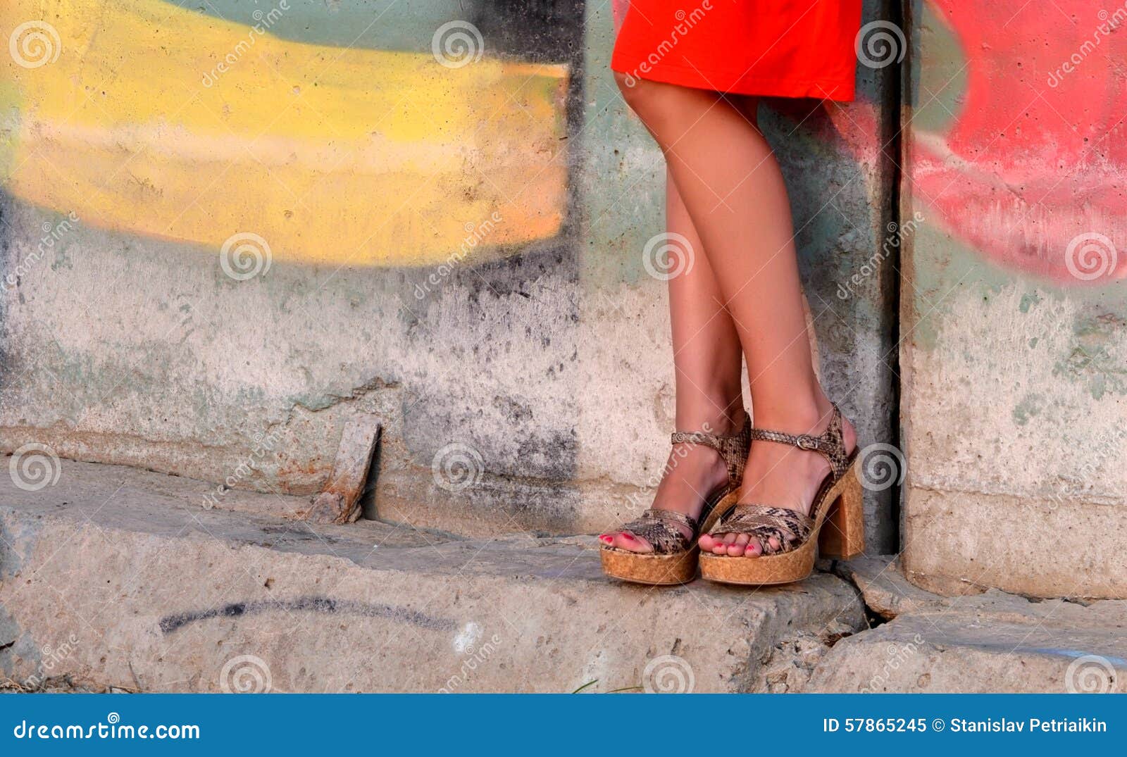 Tanned Female Legs in Heels Stock Image - Image of jeans, fashion: 57865245