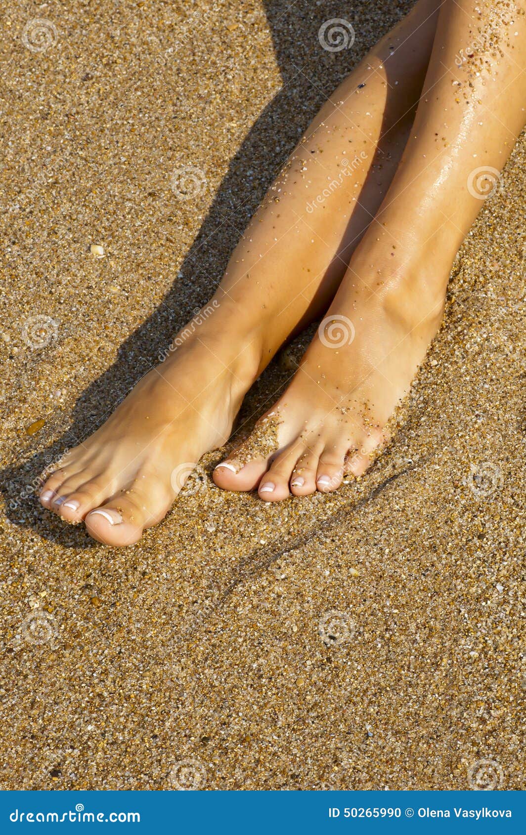 Tanned Legs in the Sand of the Sea Stock Photo - Image of tanned ...