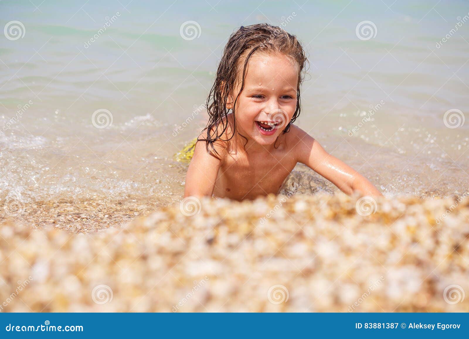 Tanned long-haired boy stock image. Image of beauty, lifestyle - 83881387