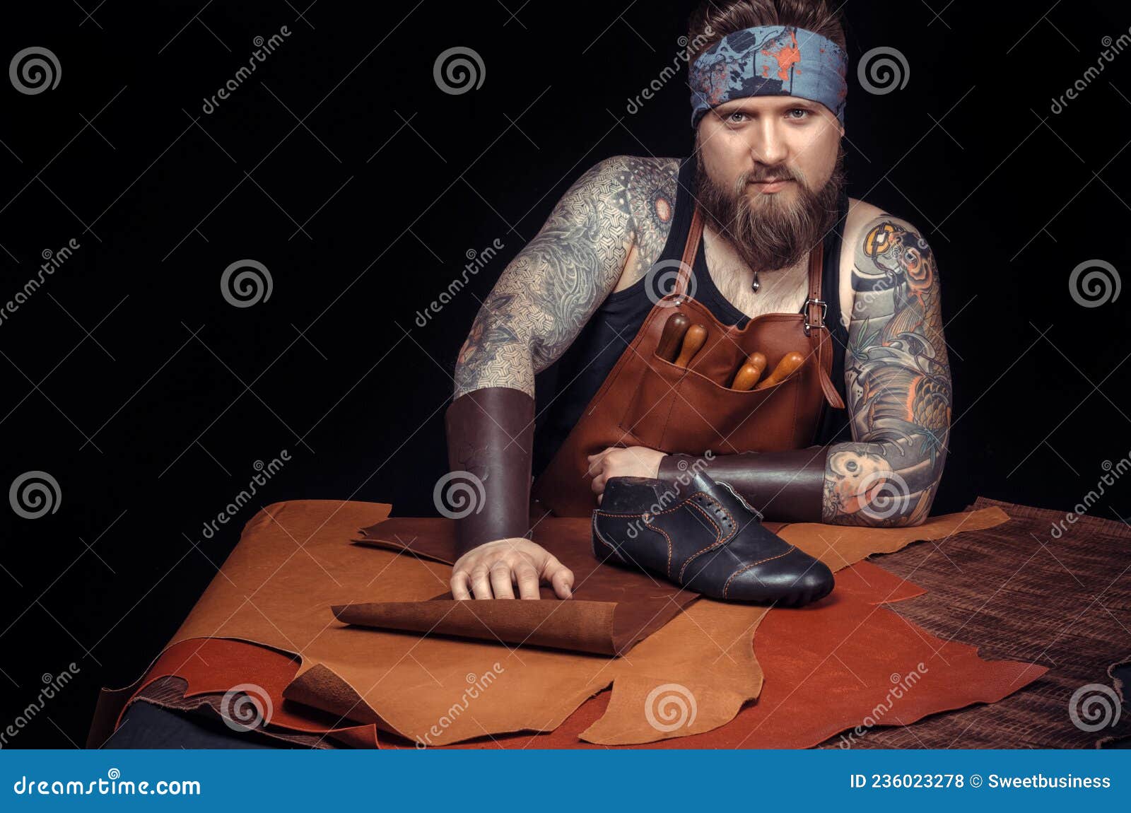 Professional Tanner Working with Leatherwork at the Workplace Stock ...
