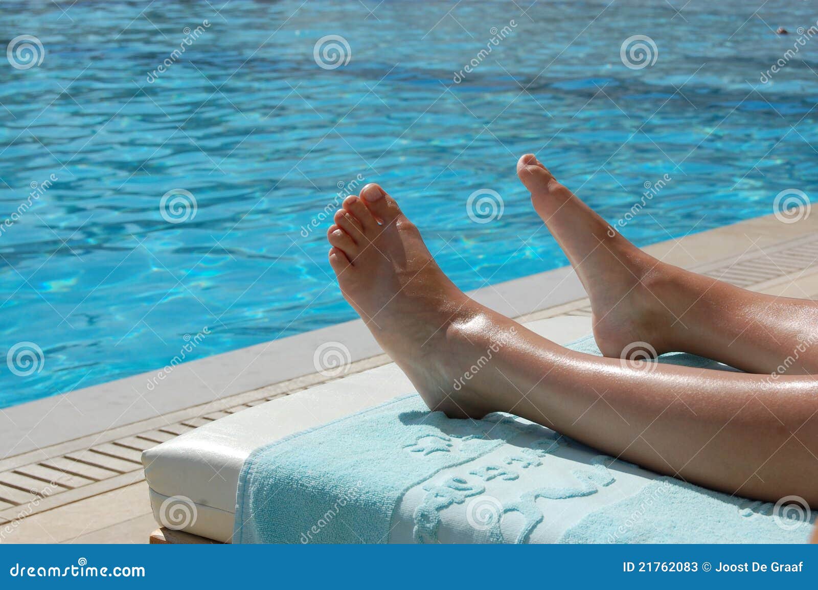Tanning at the Pool stock image. Image of beautiful, water - 21762083