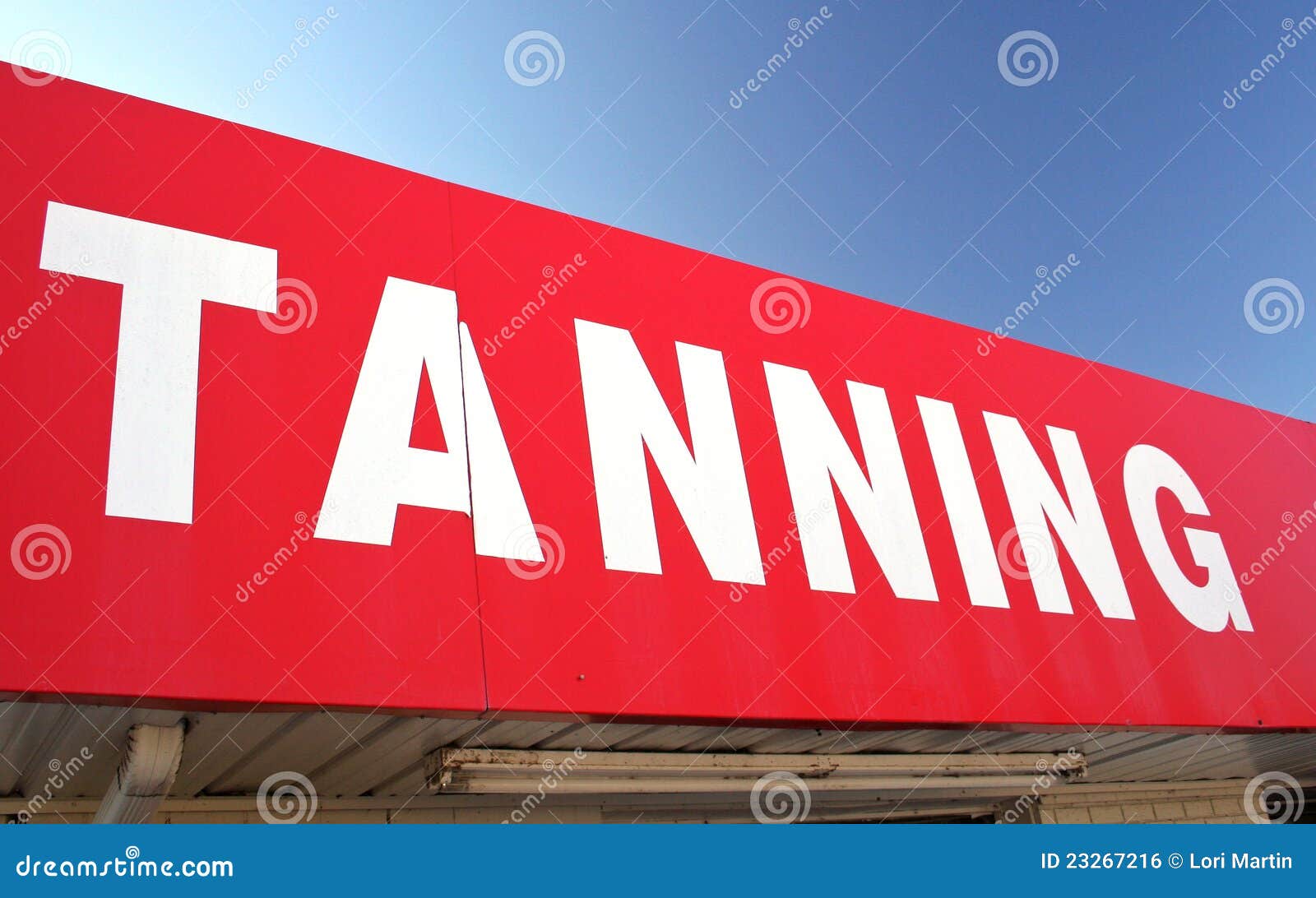 Tanning Sign on Convenience Store Stock Photo - Image of summer, beauty ...