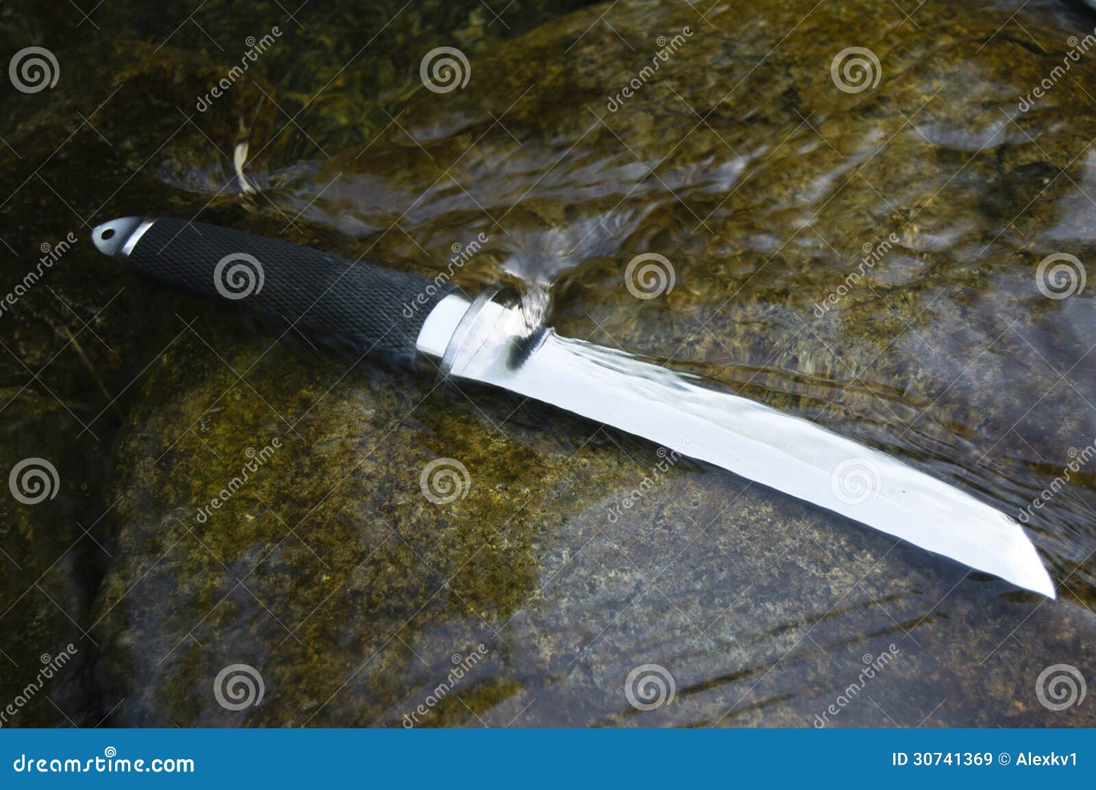 Tanto knife in water stock image. Image of drop, traditional - 30741369
