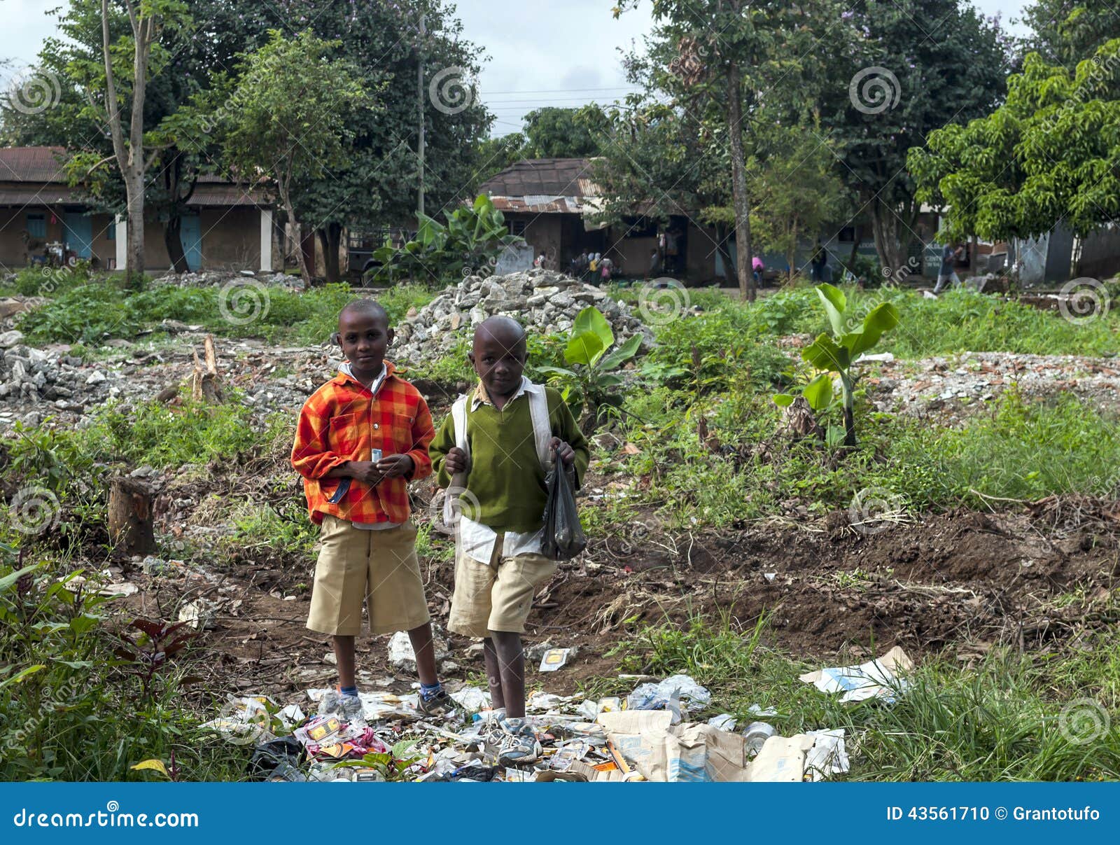 Tanzanian boys in garbage editorial image. Image of fields - 43561710