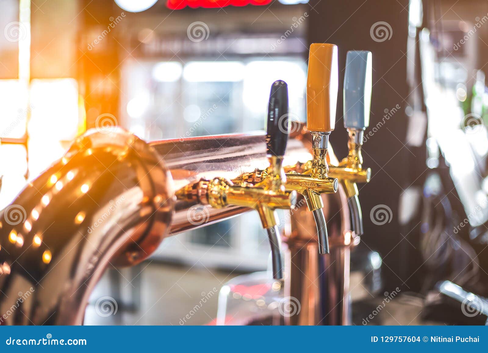 The Beer tap stock photo. Image of liquid, glass, brew - 129757604