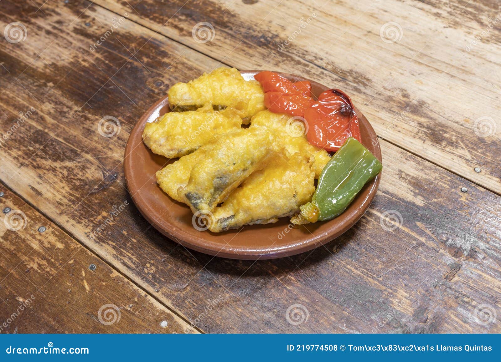Tapa of Cod and Peppers Served on a Vintage Table in a Typical Madrid ...