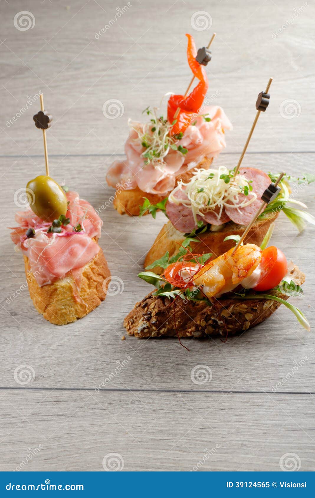 Tapas on Crusty Bread stock image. Image of background - 39124565