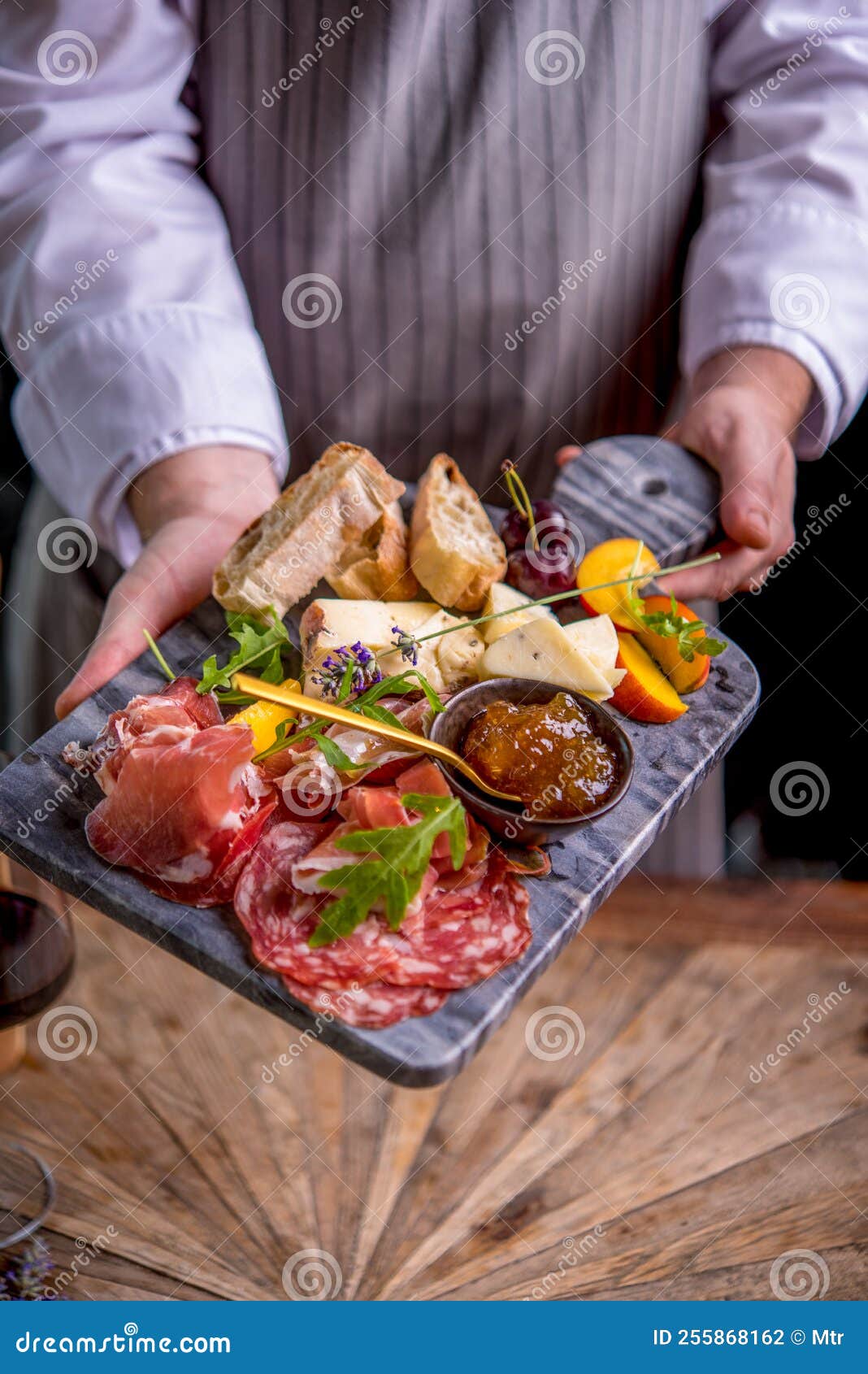 Tapas on Plate in Chefs Hands Stock Photo - Image of board, delicious: 255868162