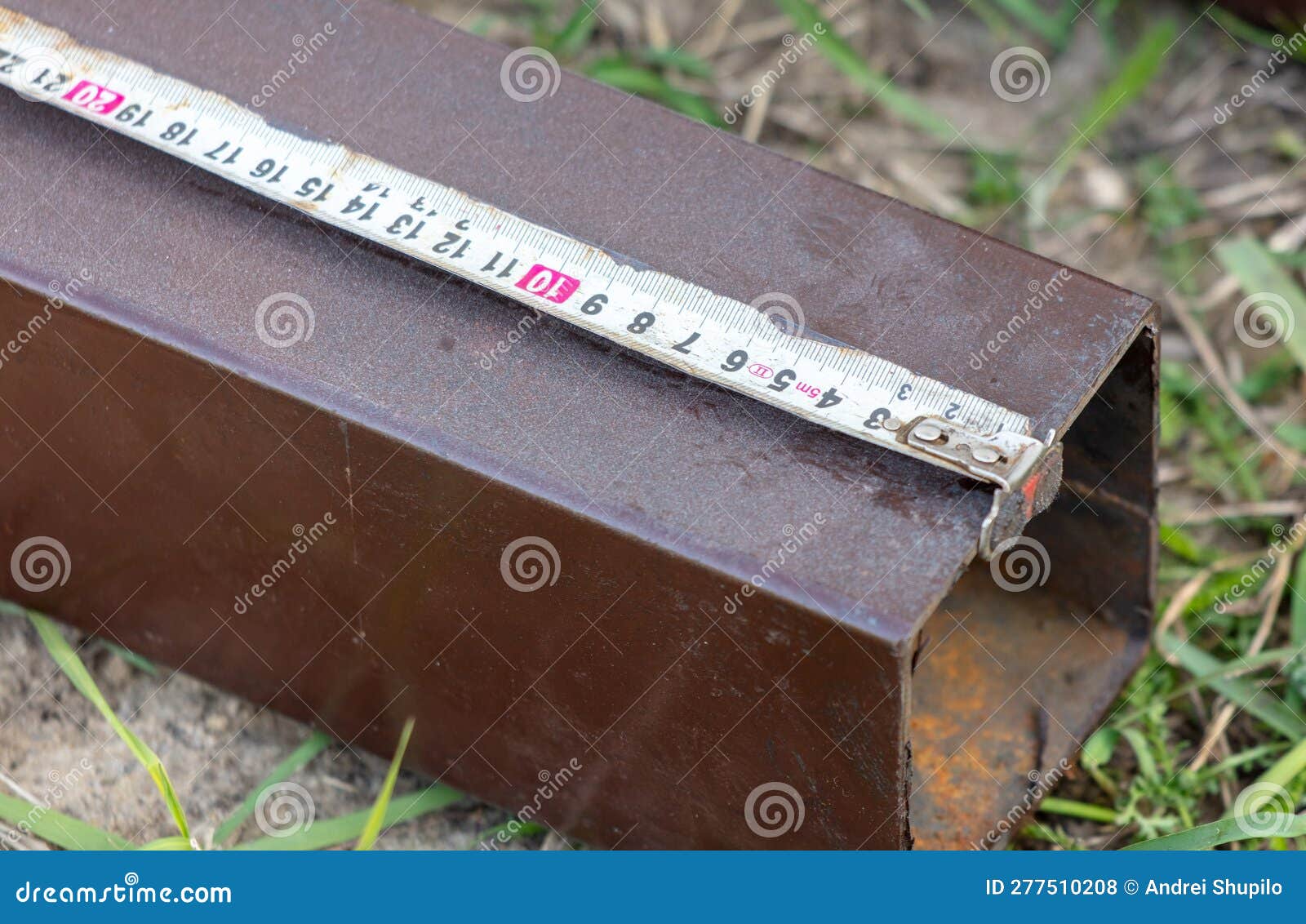 Tape Measure on the Ground, Close Up Stock Photo - Image of black ...