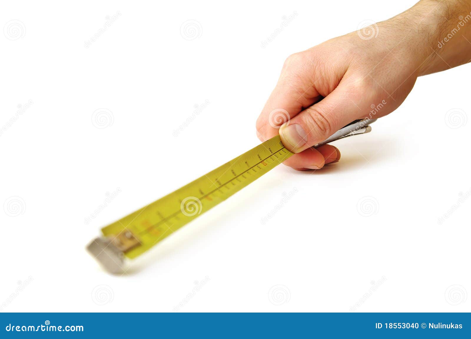 Tape-measure in hand stock photo. Image of centimeter - 18553040