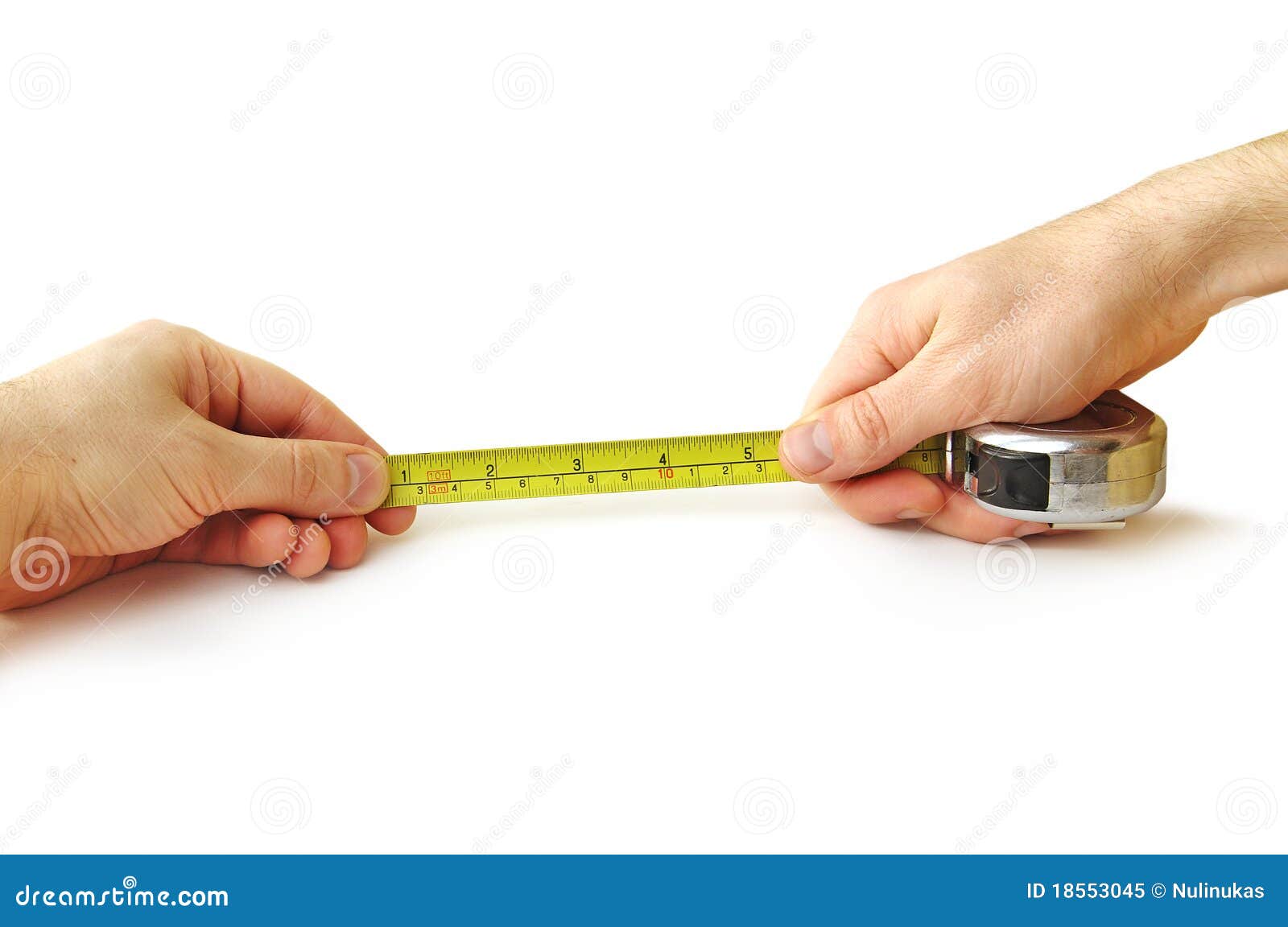Tape-measure in hands stock image. Image of construction - 18553045