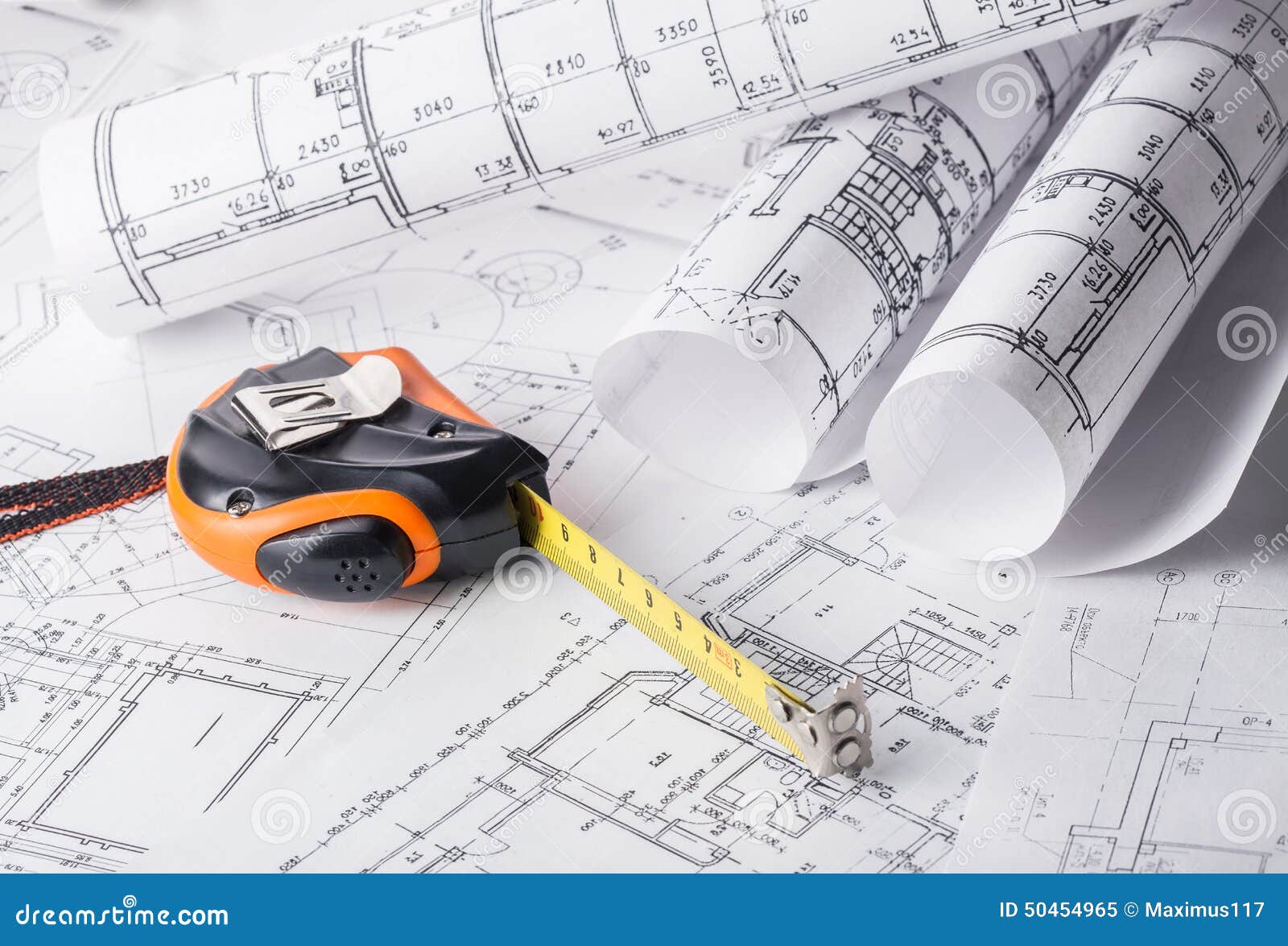 Tape Measure Over a Construction Plan Drawing Stock Image - Image of ...