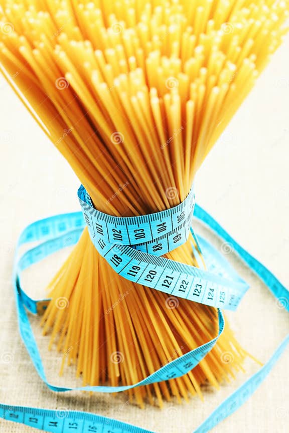 Tape measure and spaghetti stock image. Image of vegetarian - 15216311