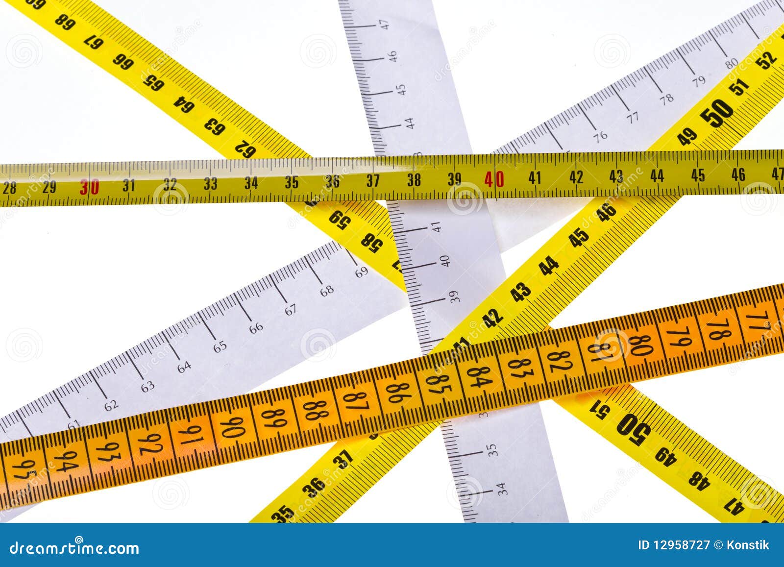 Tape measures cross stock image. Image of measurement - 12958727