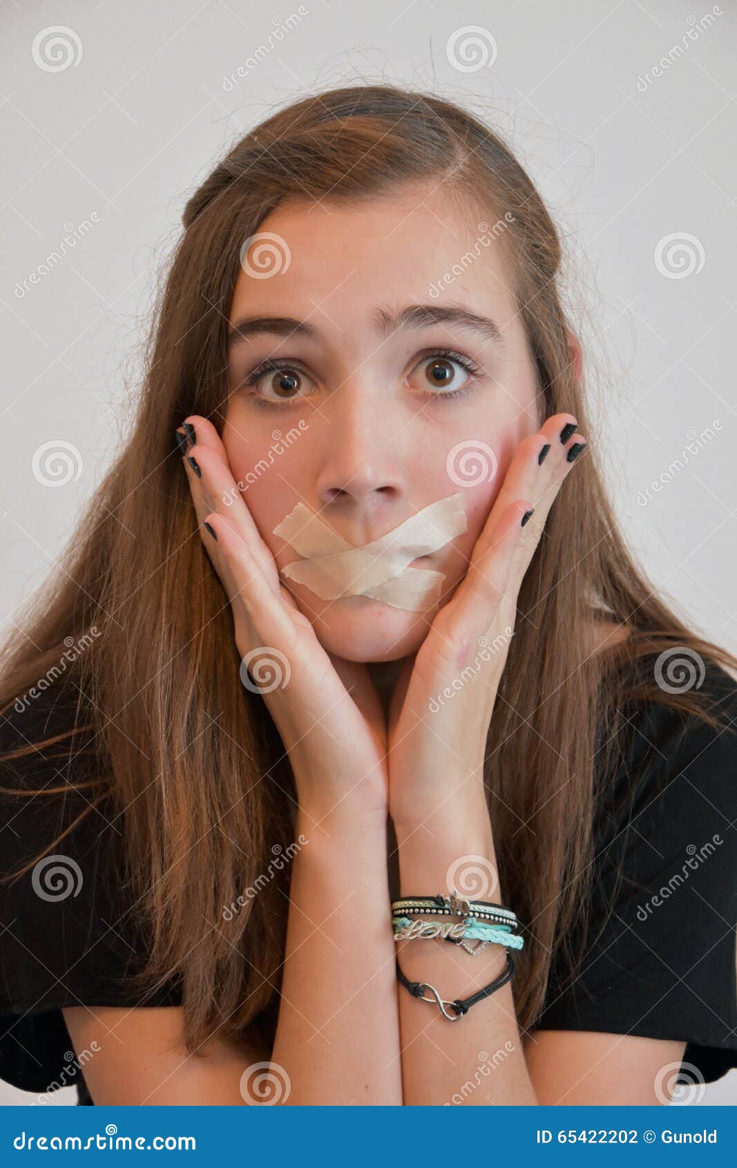 Taped mouth stock photo. Image of looking, girl, fearful - 65422202